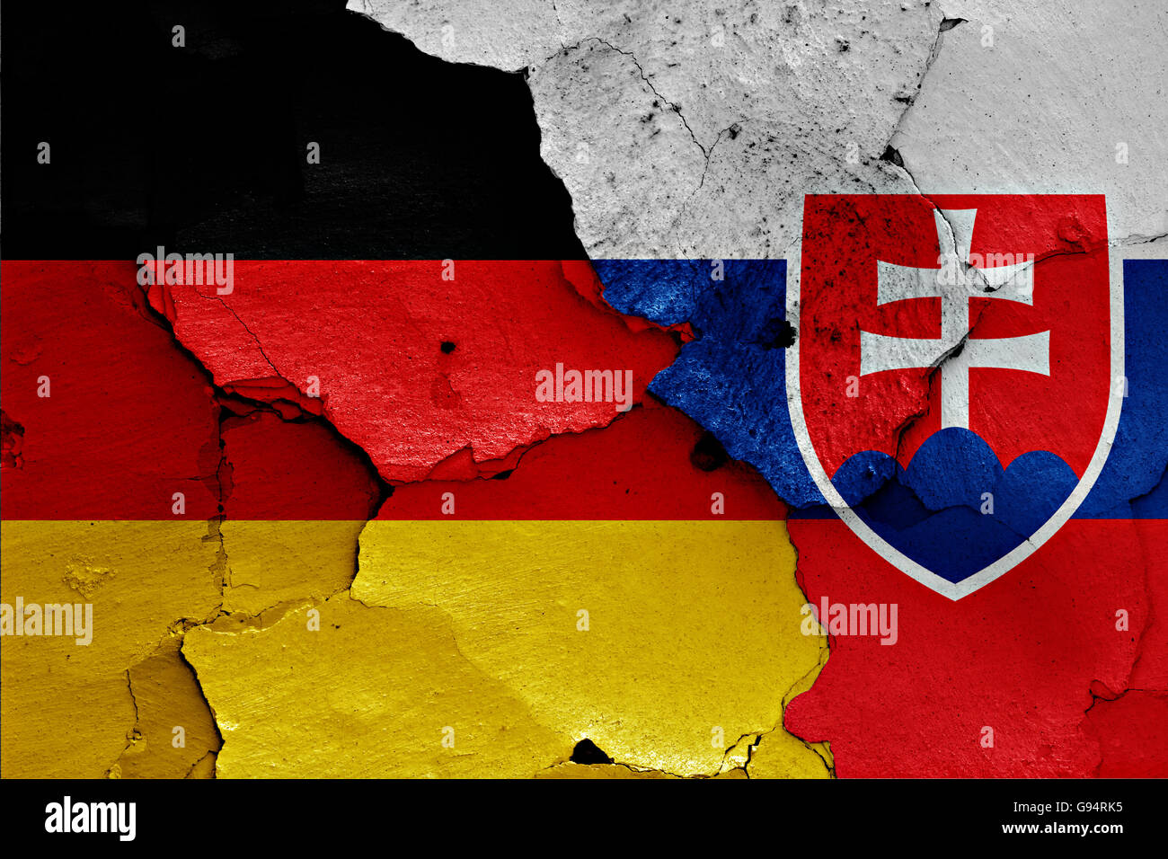flags of Germany and Slovakia painted on cracked wall Stock Photo - Alamy