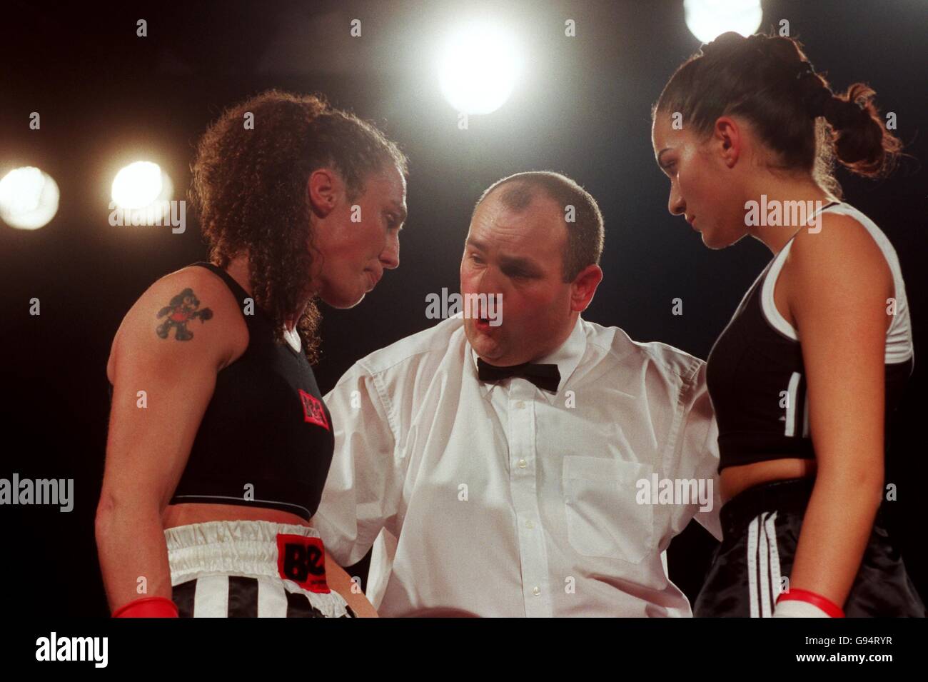 The referee lays down the law to Jane Couch (left) and Semon Lukic ...