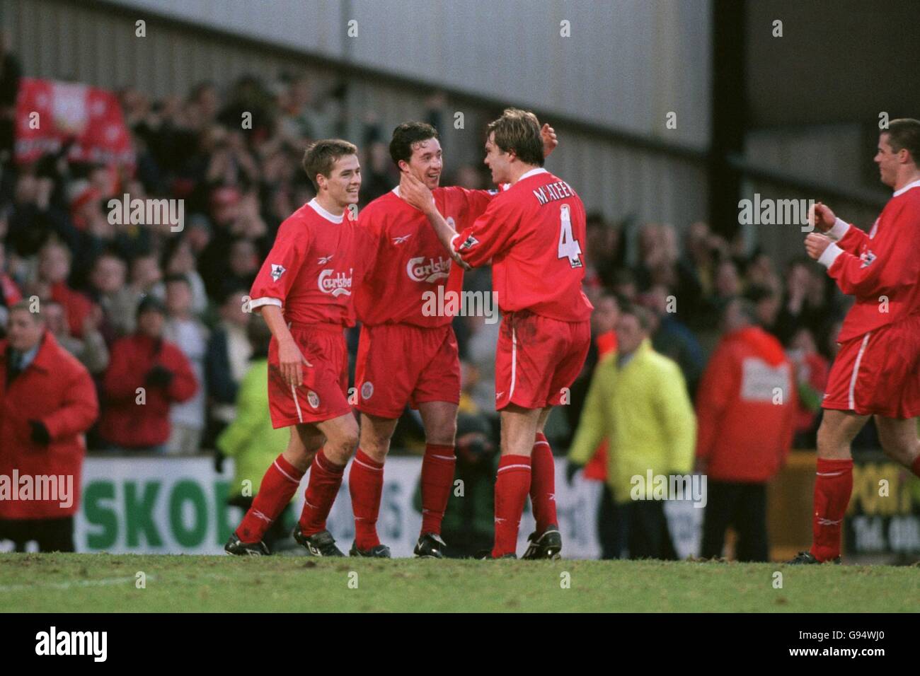 Robbie Fowler of Liverpool is congratulated on his late goal Stock ...