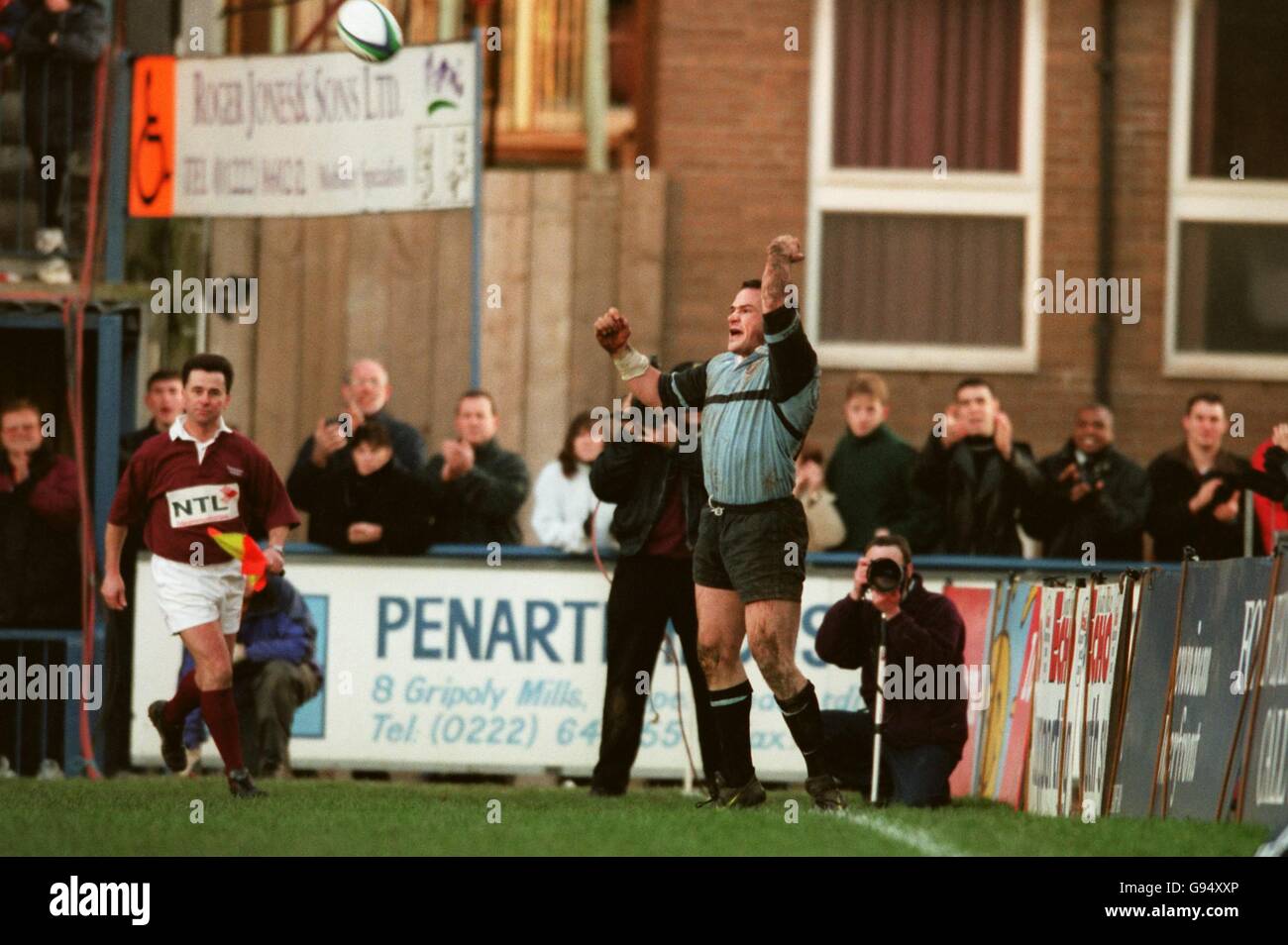 Matthew Wintle, Cardiff celebrates scoring a try by throwing the ball ...