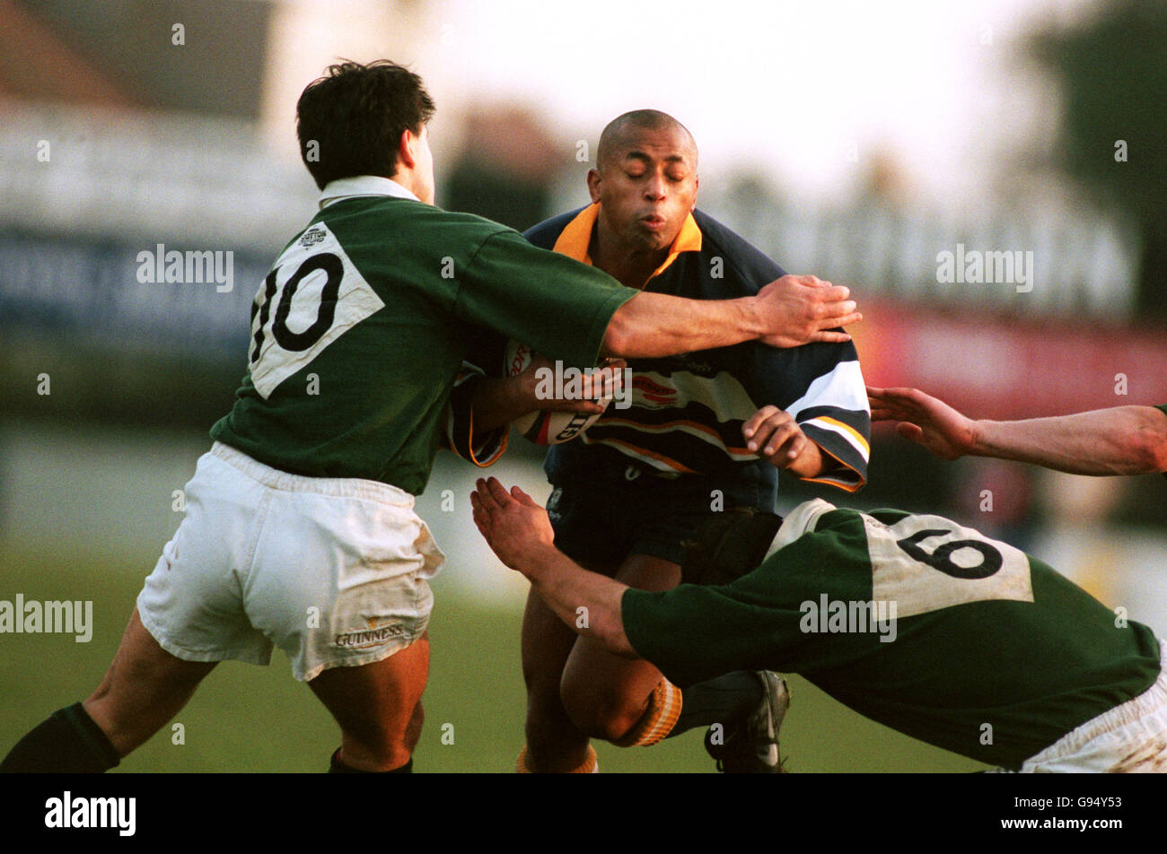 Bristol's Paul Hull is tackled London Irish's Stephen Bachop and Jake ...