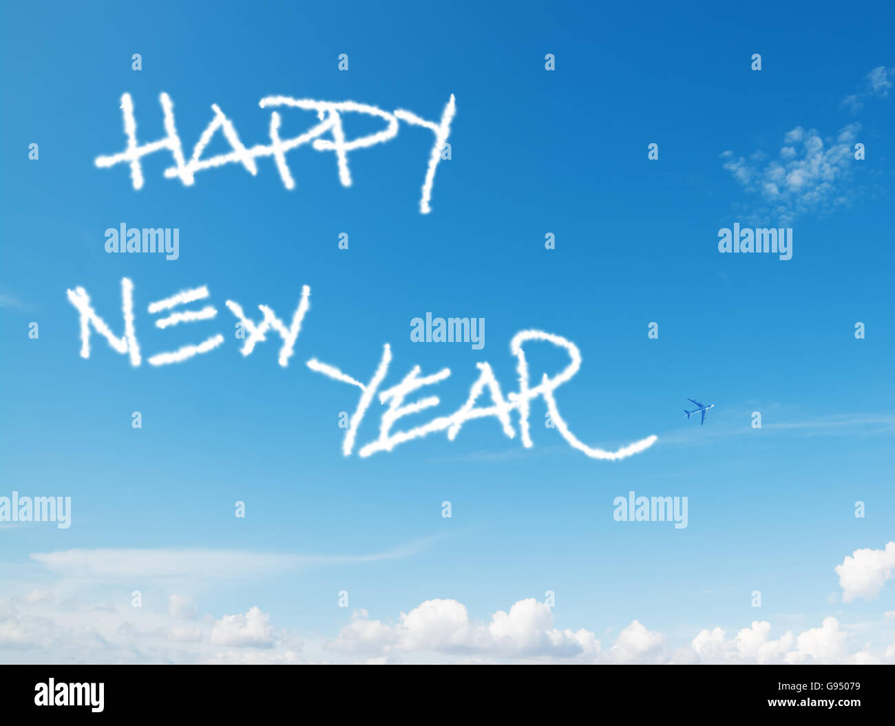 "happy new year" written in the sky with contrails left by airplane ...