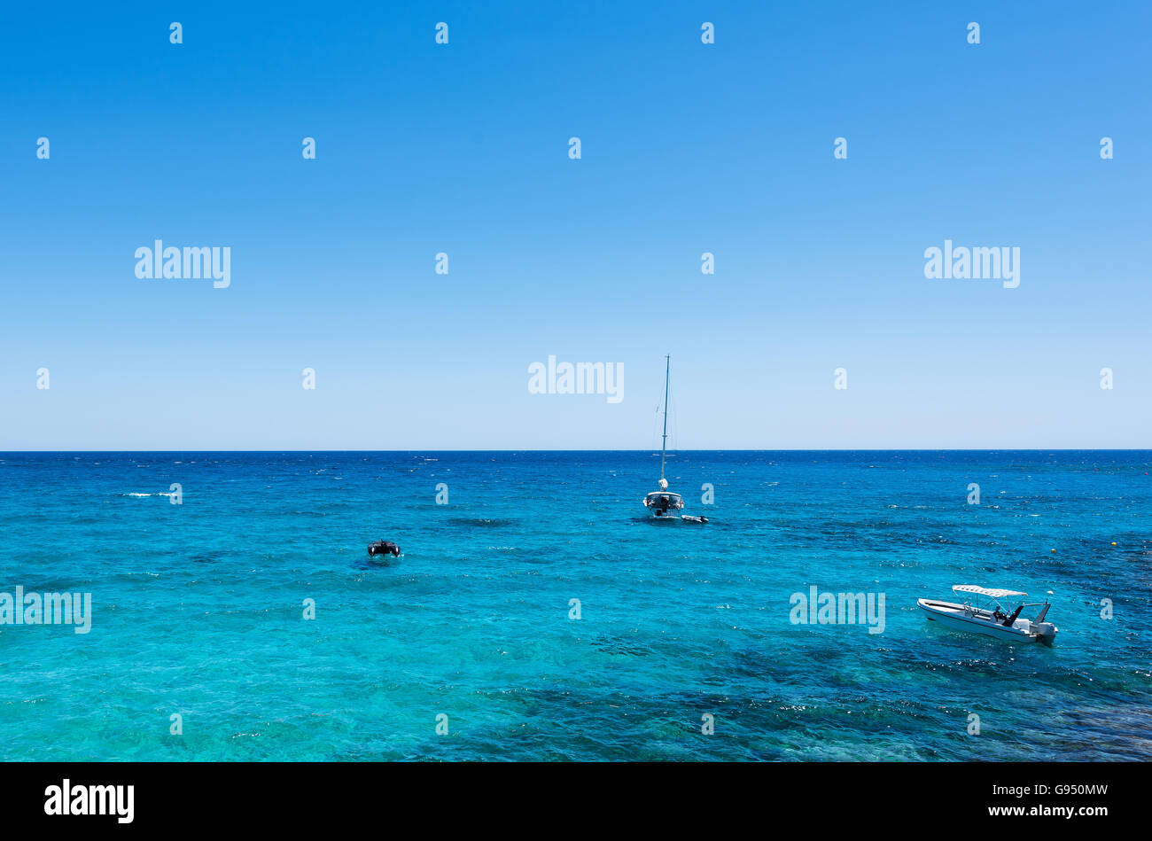 Photo of sea in protaras, cyprus island with boats and immaculate water ...