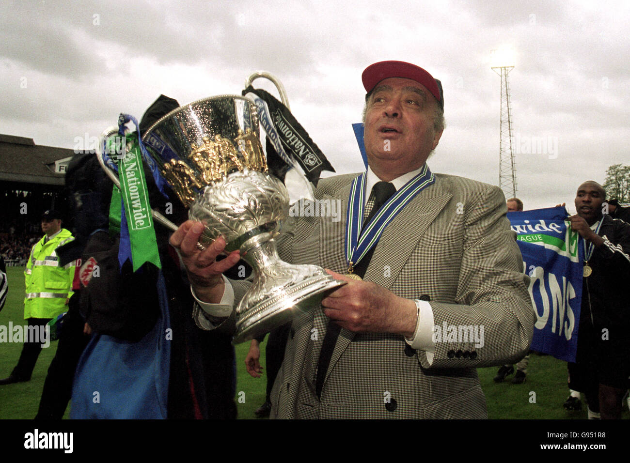 Fulham's chairman Mohamed Al Fayed stands with the Division Two ...