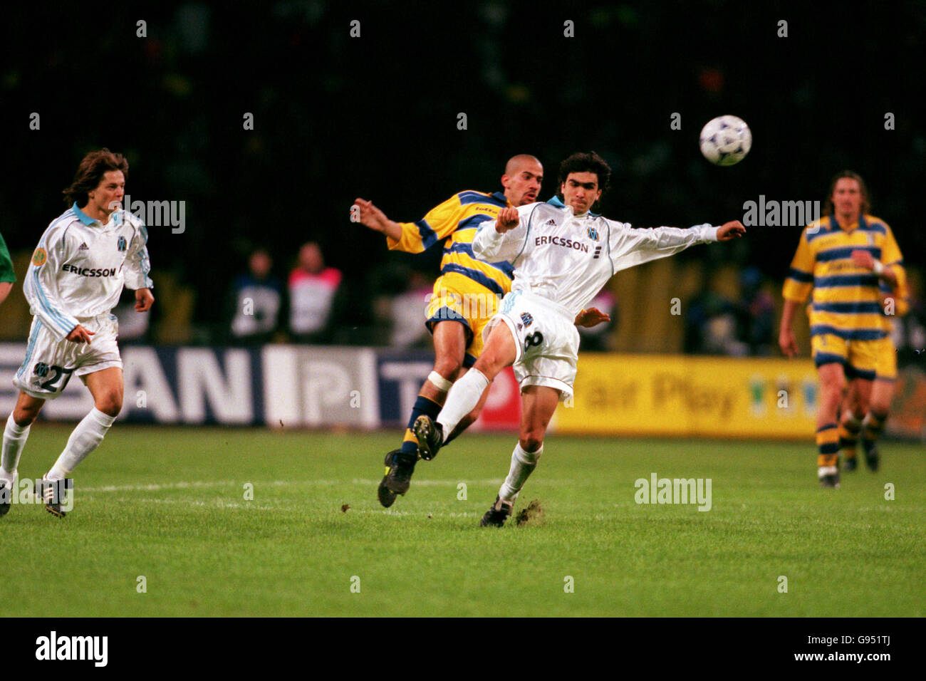 Olympique Marseille's Frederic Brando (right) is beaten to the ball by ...