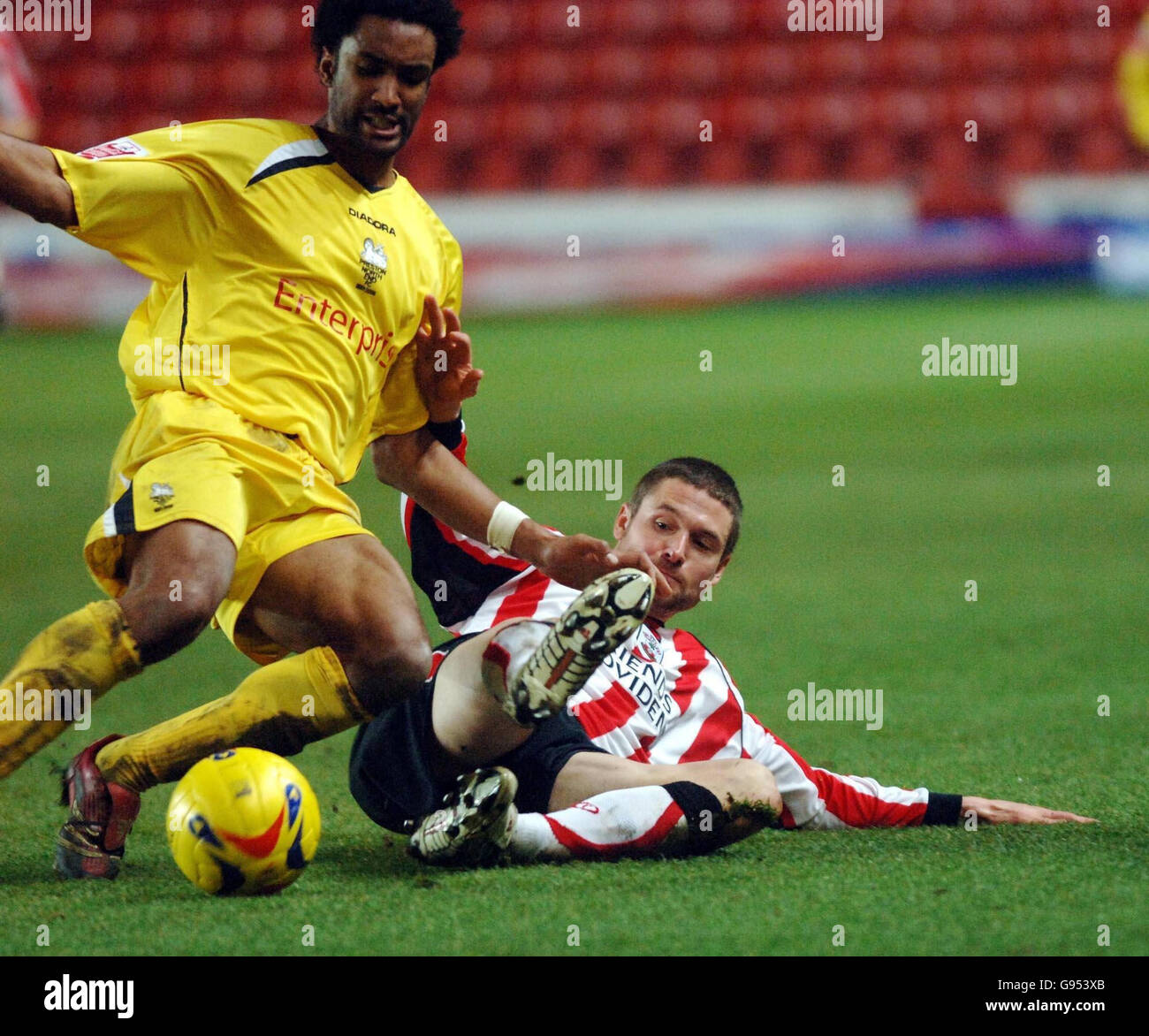 Prestons Youl Mawene (L) battles with Southampton's Peter Madsen during ...