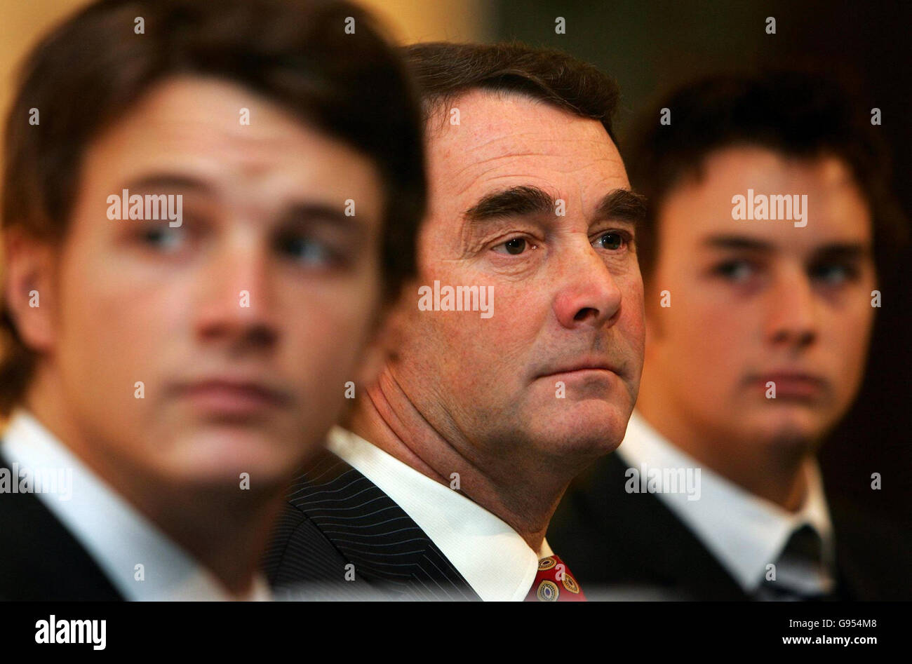 Former World F1 Champion Nigel Mansell (C) with his son's Leo (L) and ...