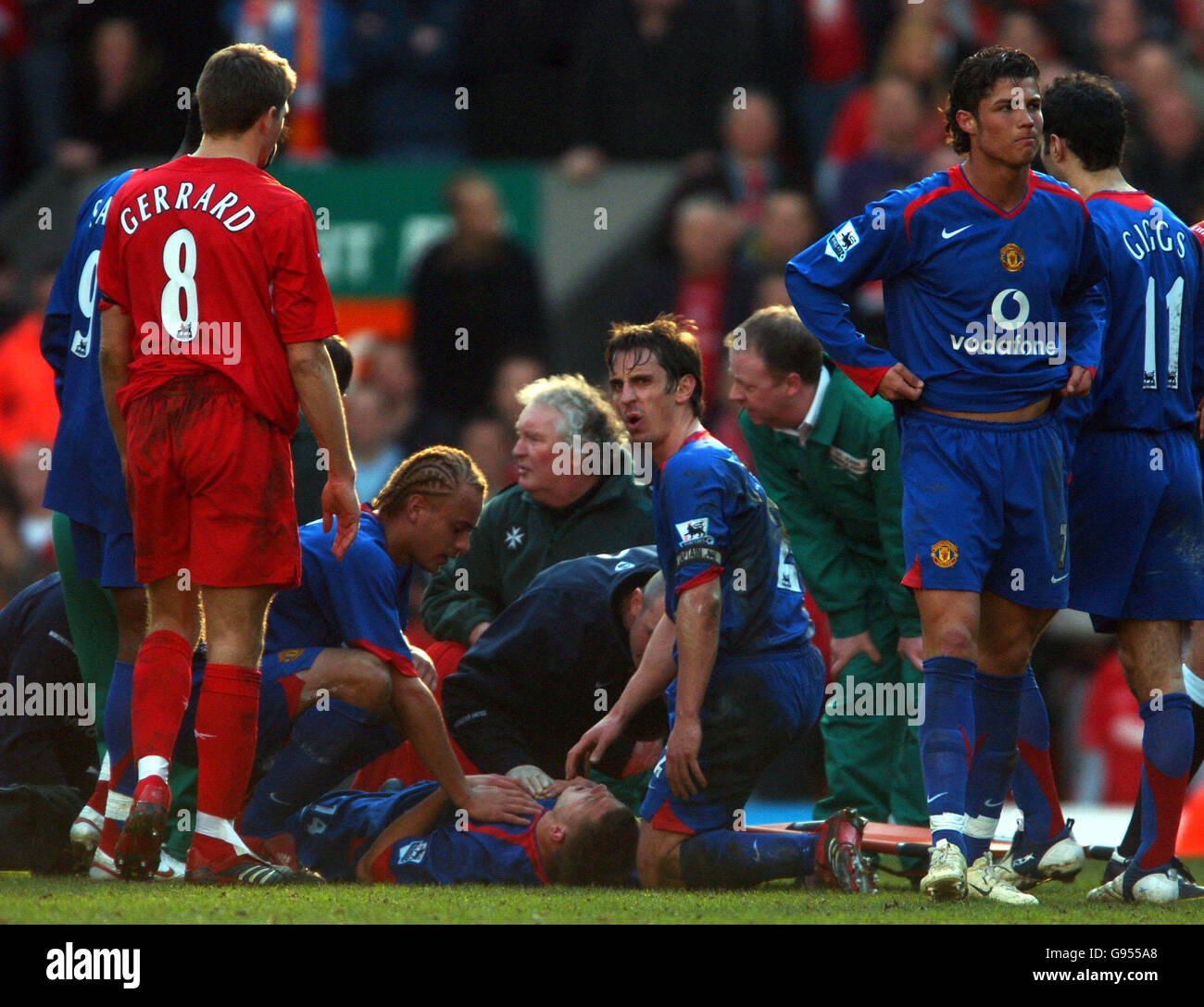 Manchester United's Gary Neville reacts in horror to Alan Smith's ...
