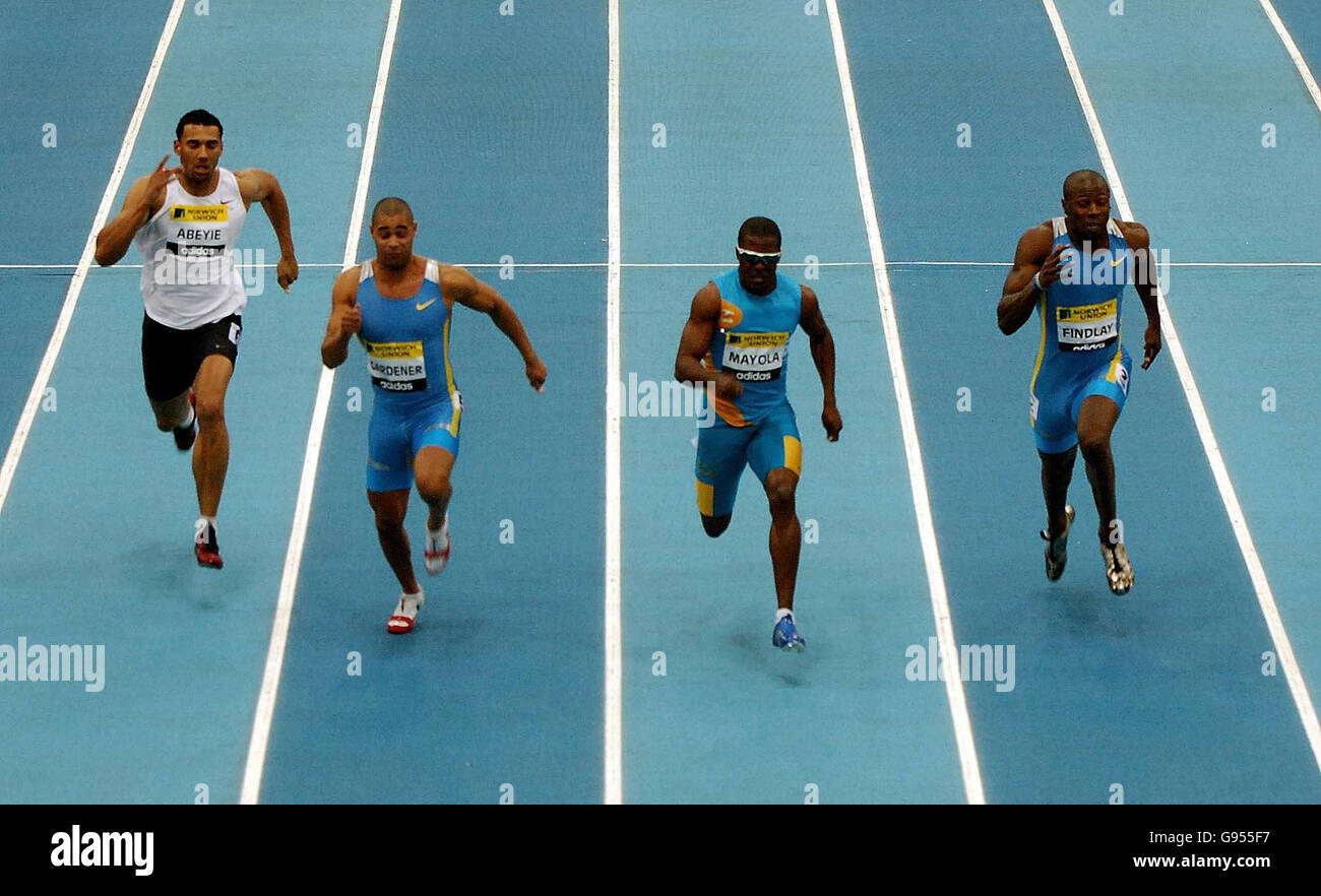 Cuba's Freddy Mayola (second right) wins the 60m men final with Great ...