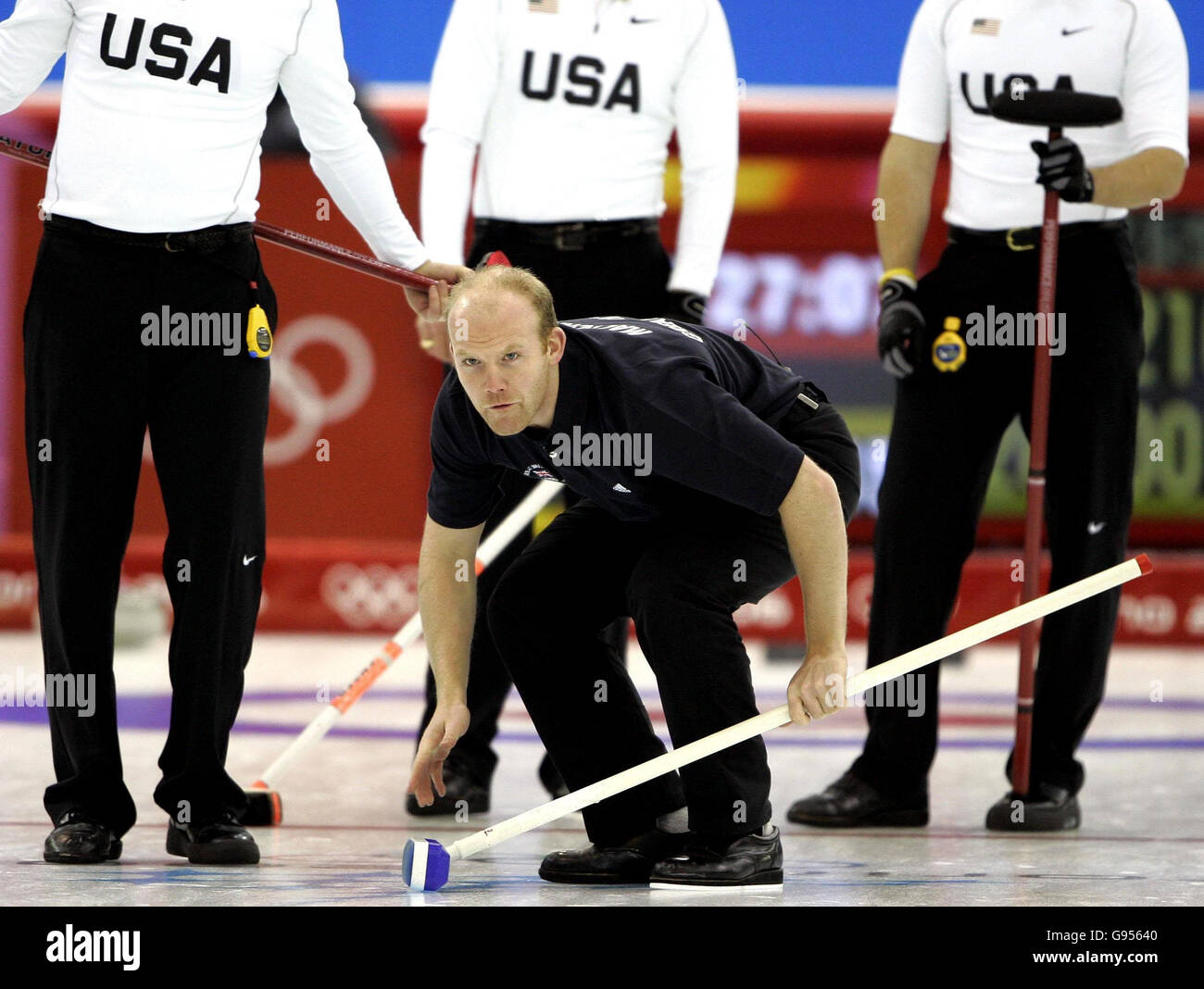 Great Britain's Ewan MacDonald in action during the men's curling match ...