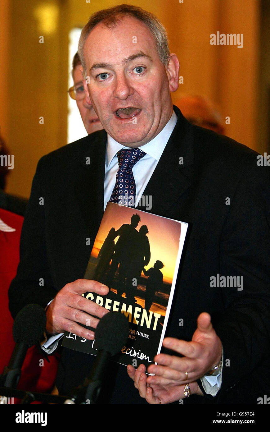 Leader of the SDLP Mark Durkan holds a copy of the Good Friday ...