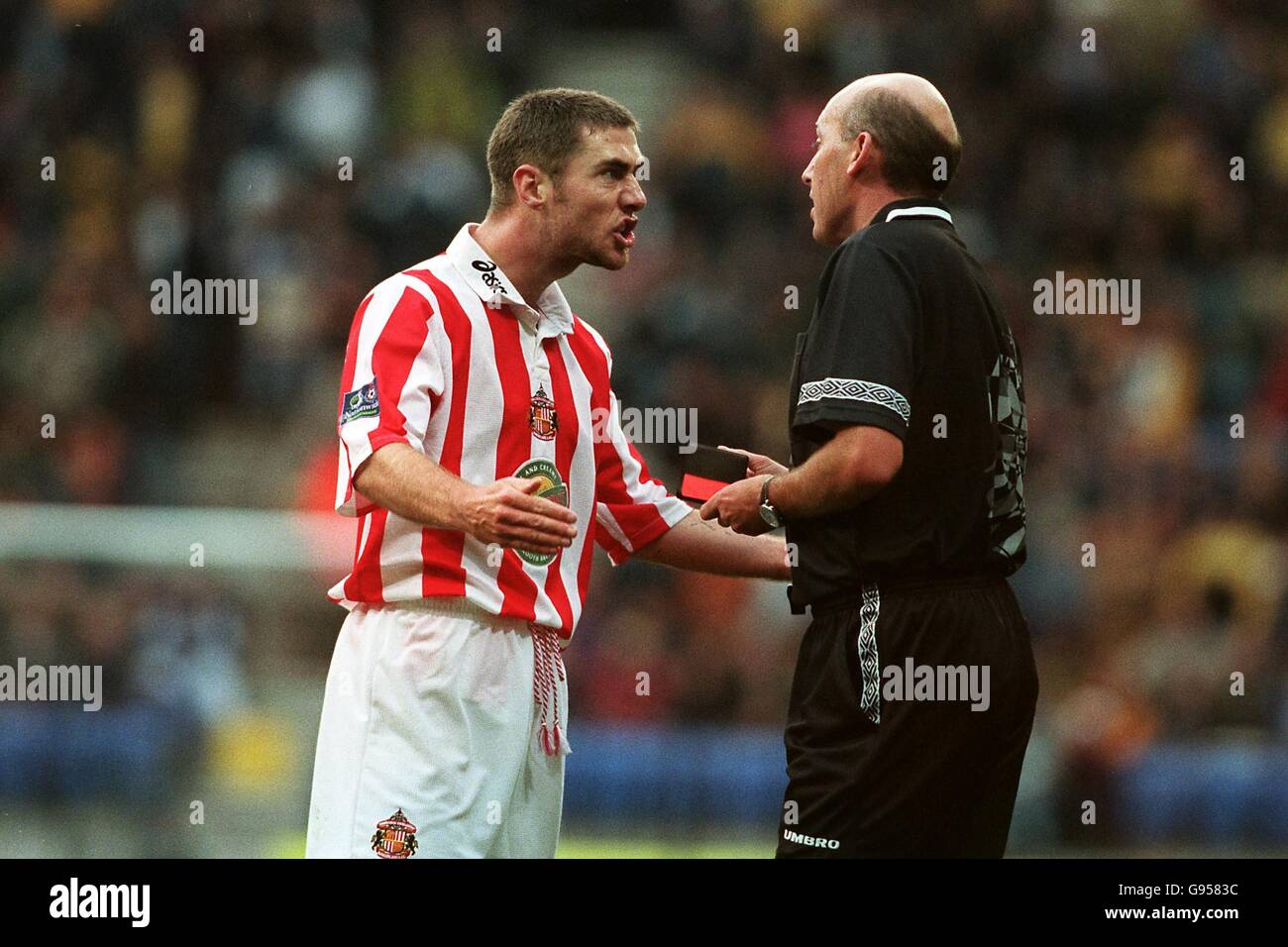 Chris Makin of Sunderland (left) argues with referee B. Knight (right ...