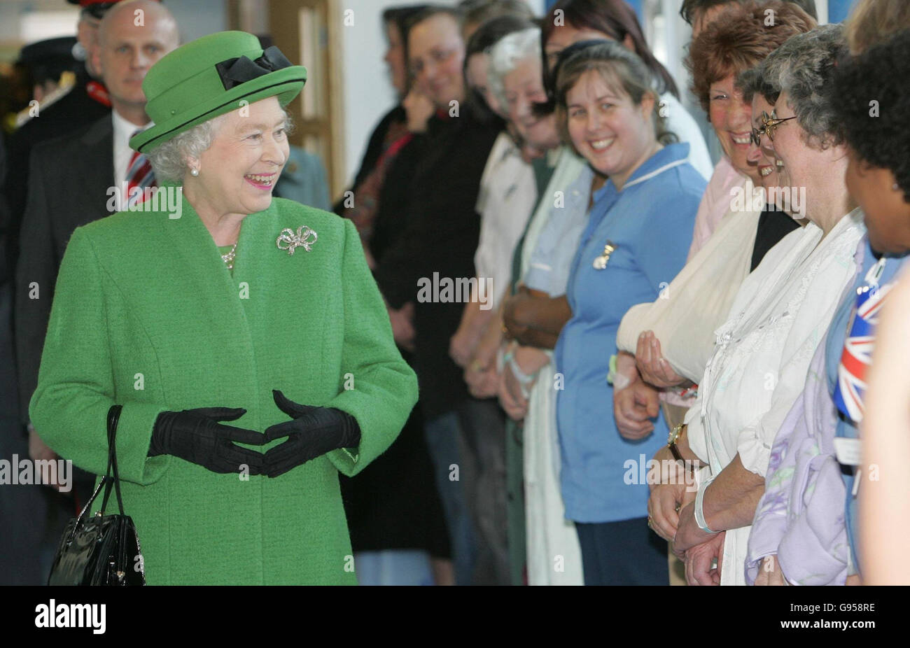 Britain's Queen Elizabeth II meets staff at The Royal Berkshire ...