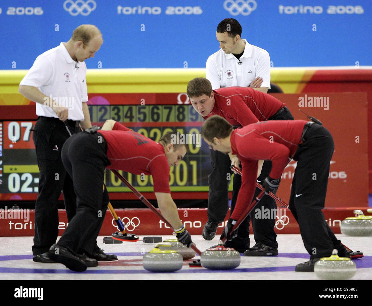 Great Britain's mens curling skip David Murdoch (back right) looks away ...