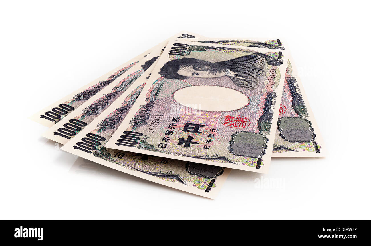 Japanese yen banknotes on white background Stock Photo - Alamy