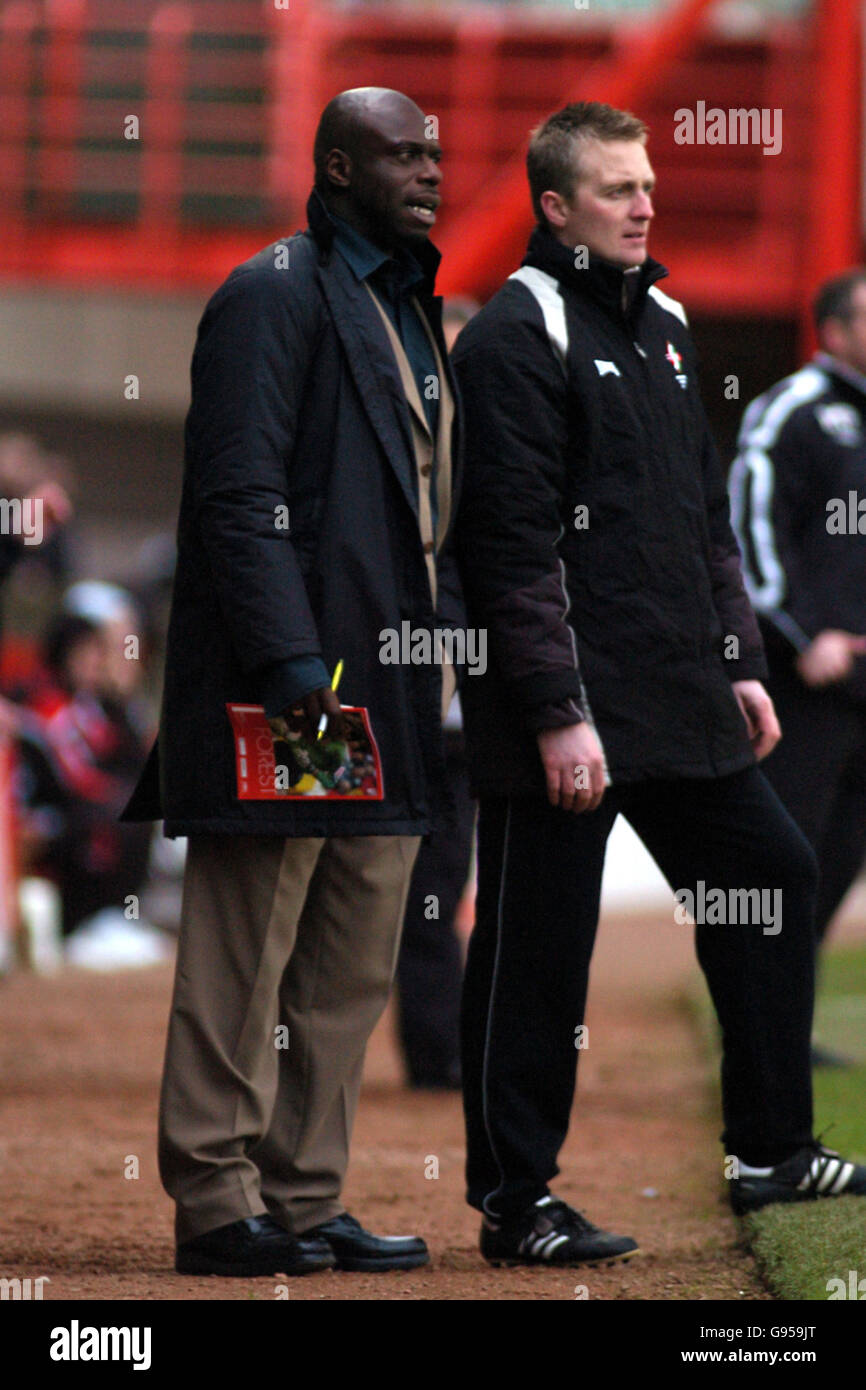Swindon Town's manager Iffy Onuora (l) with assistant manager Alan ...