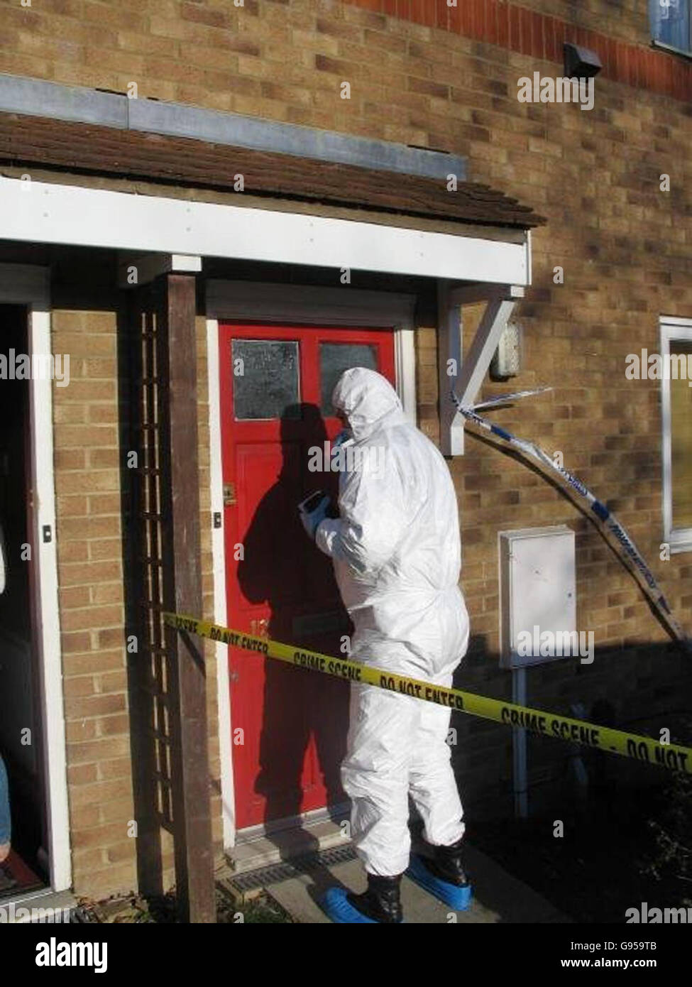 A Police Forensic Officer Searches A House In Lambersart Close Near