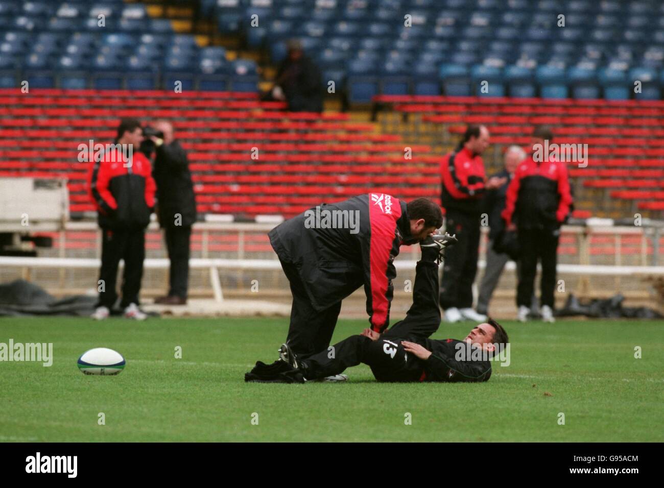 Wales's ex New Zealand international Shane Howarth (on floor ...