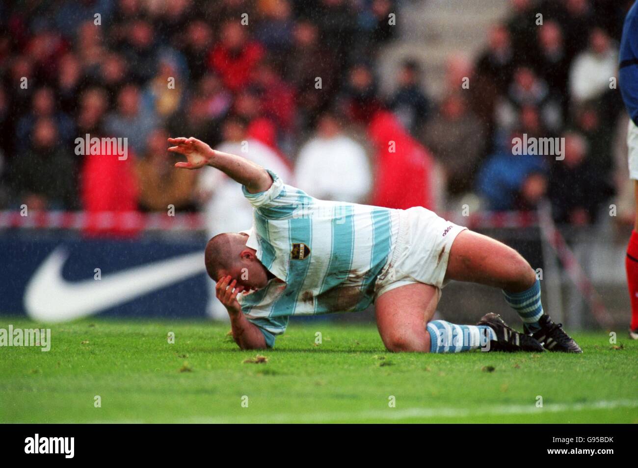 Argentina's Martin Durand goes down with a head injury Stock Photo - Alamy