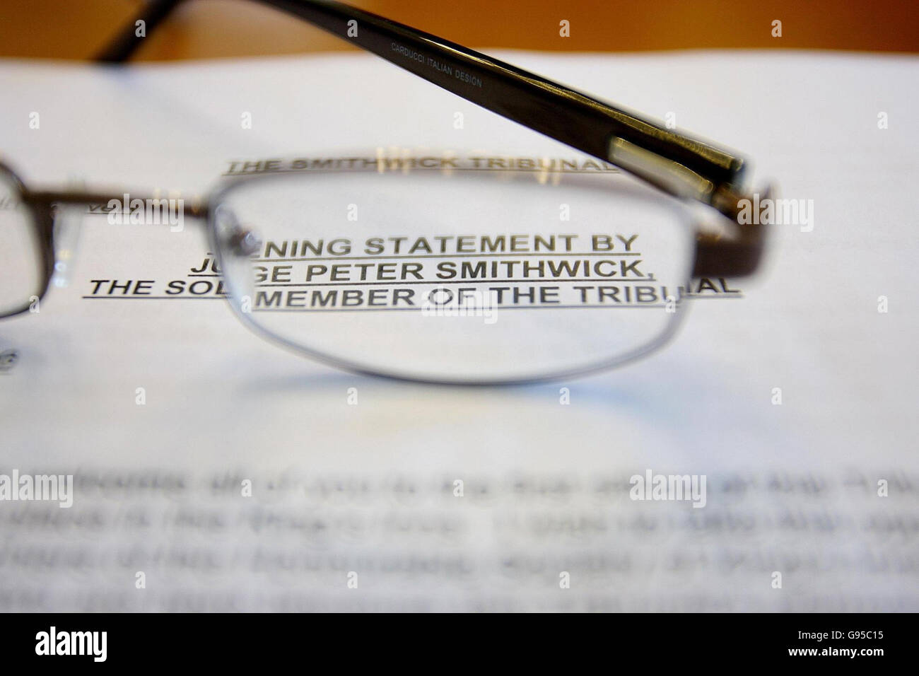 A pair of glasses on the statement by Judge Peter Smithwick on the ...