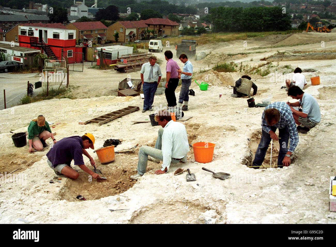 Archaeologists dig over the site of an anglo saxon cemetery hi-res ...