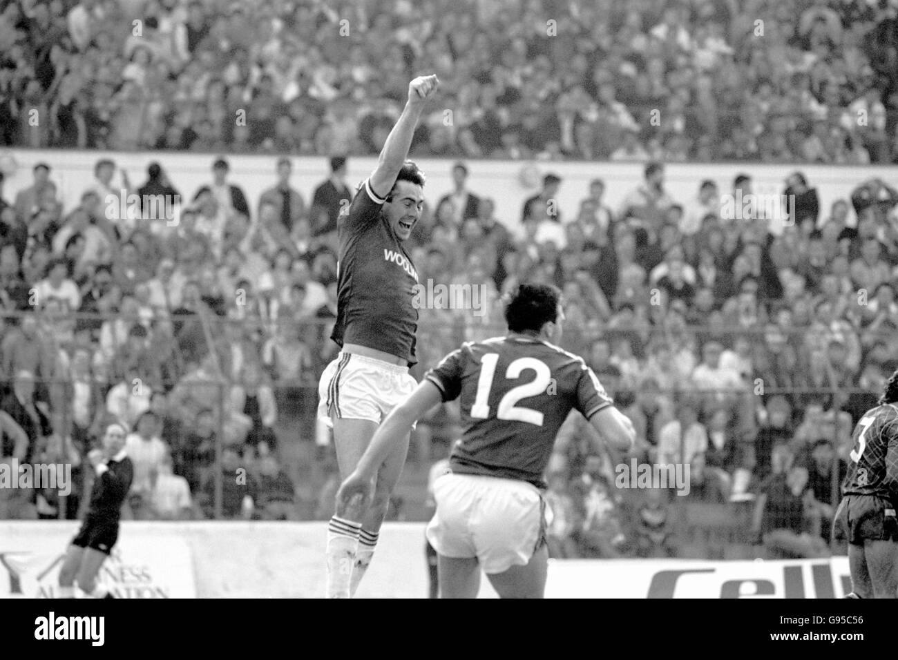 Celebration goal equalising football Black and White Stock Photos ...