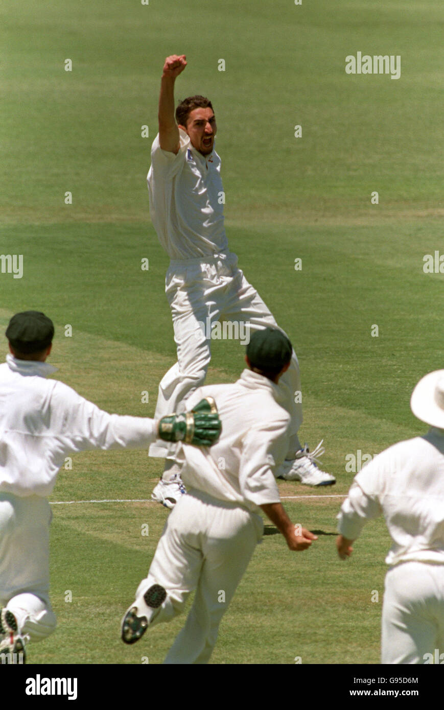 Australia's Jason Gillespie celebrates the wicket of Graeme Hicks ...