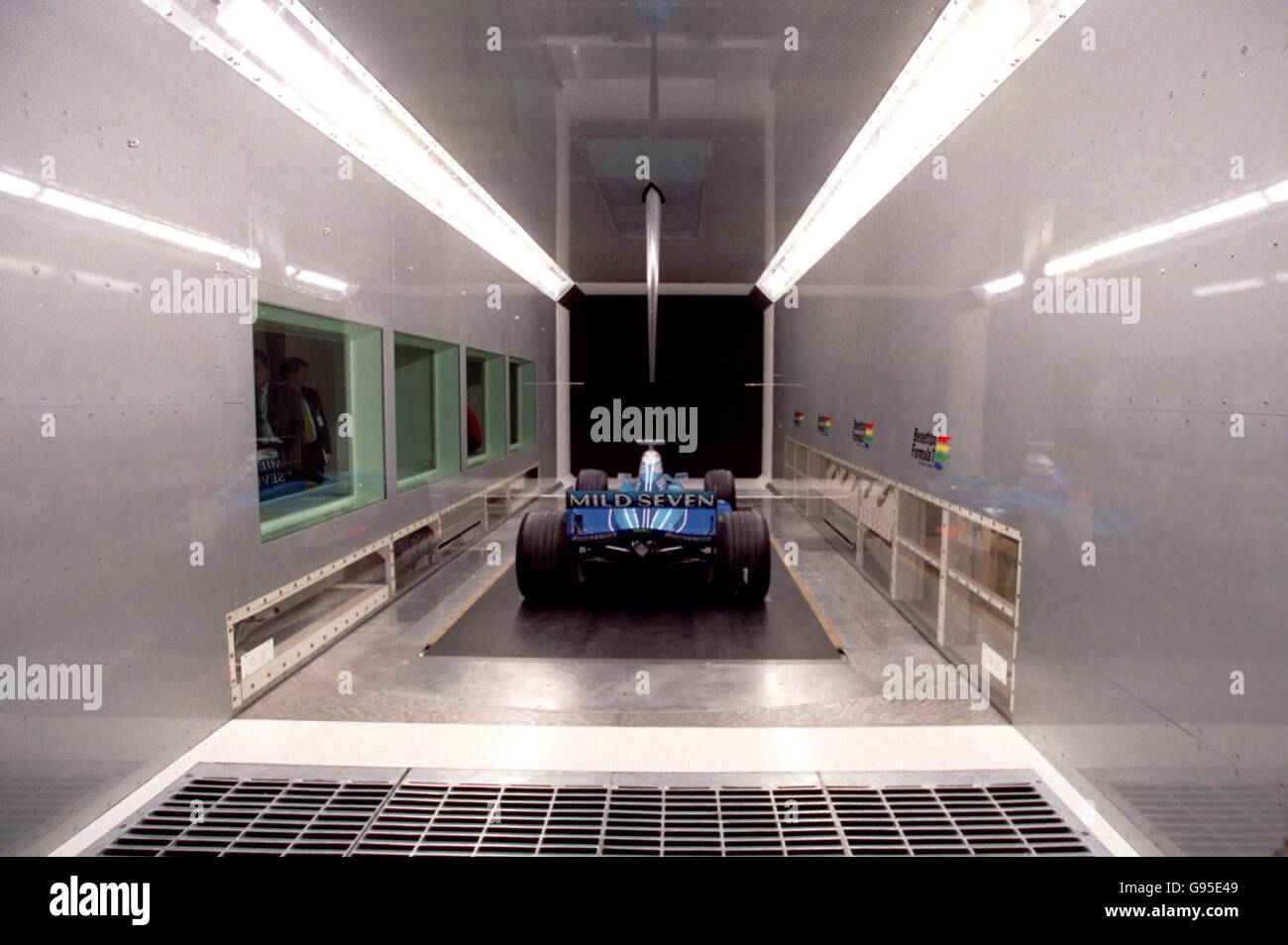 The Benetton Playlife Formula One car sits on the platform inside the ...