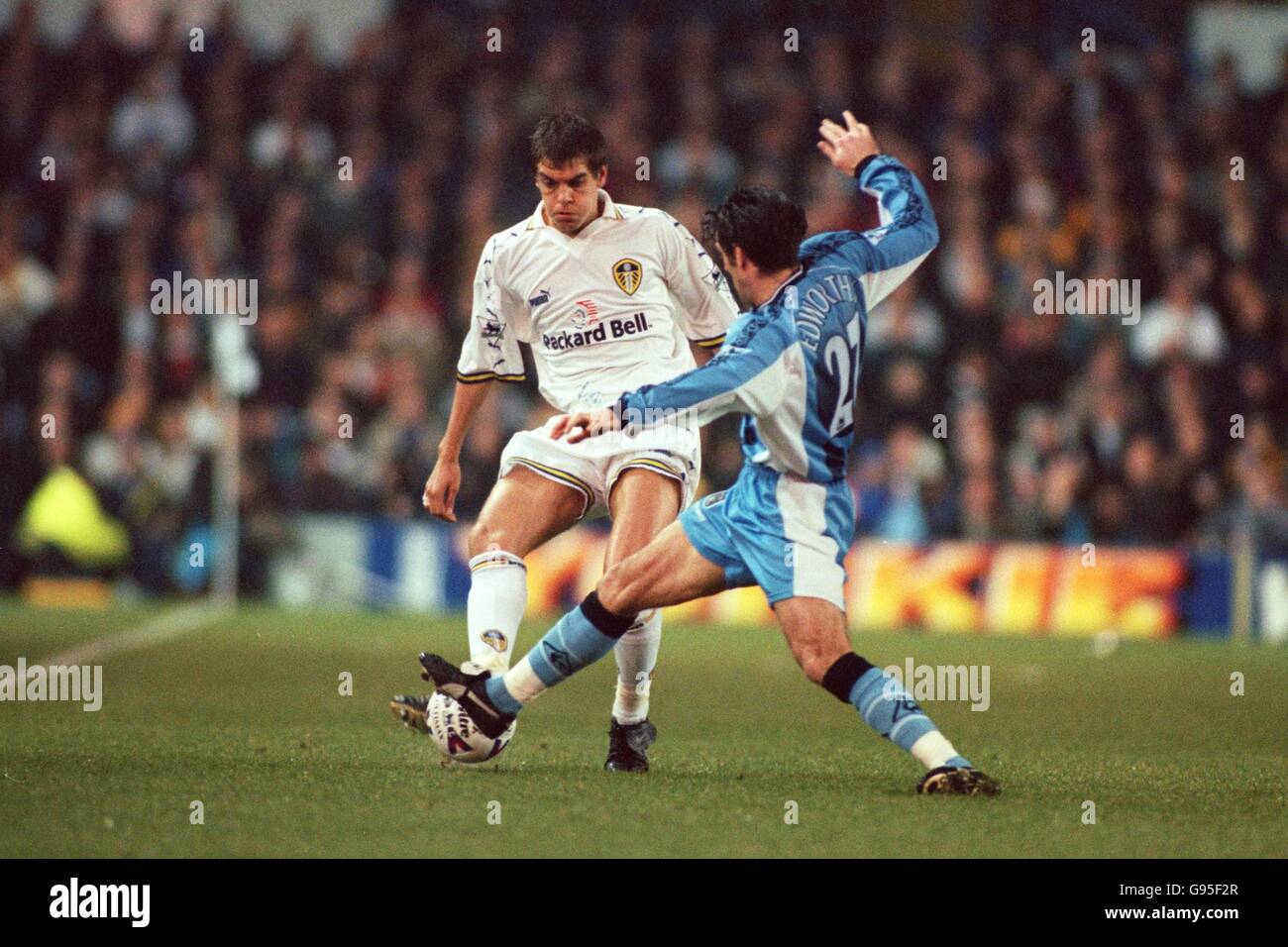 Coventry City's Marc Edworthy tries to tackle Leeds United's Jonathan ...