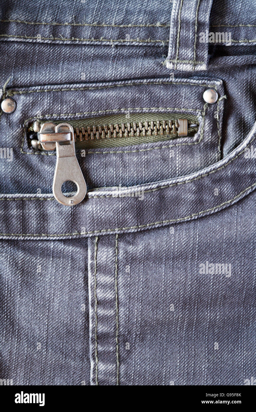 Closeup gray jeans background with pocket and zipper Stock Photo - Alamy