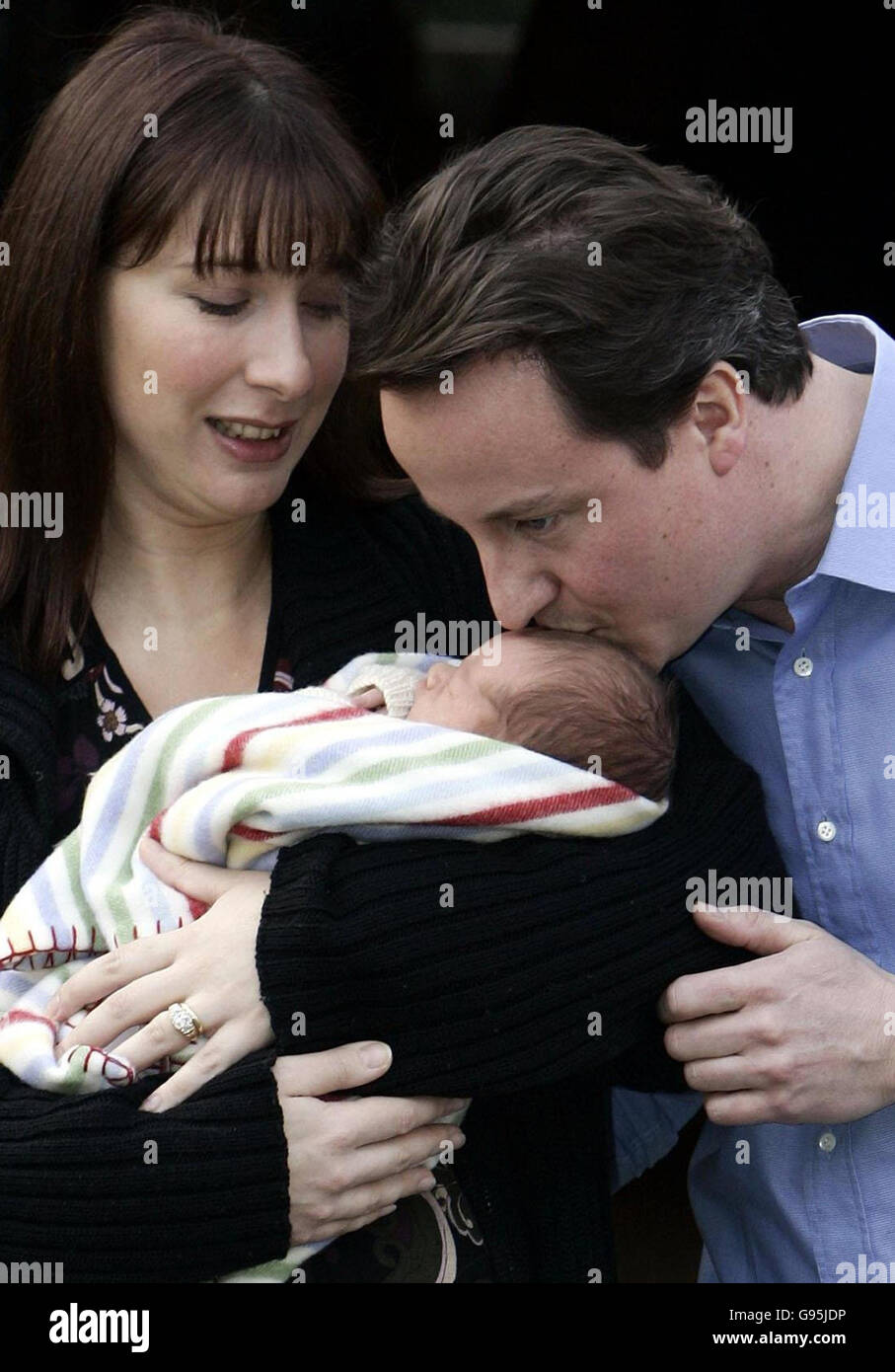 Conservative party leader David Cameron and his wife, Samantha, stand ...