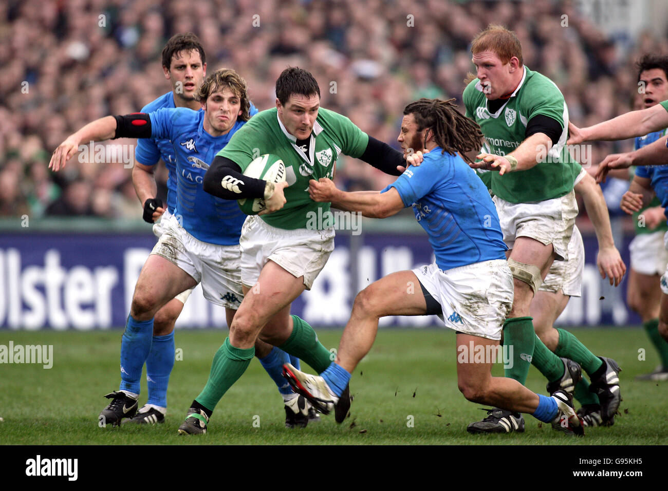 Irelands david wallace is tackled by italys paul griffen hi-res stock ...