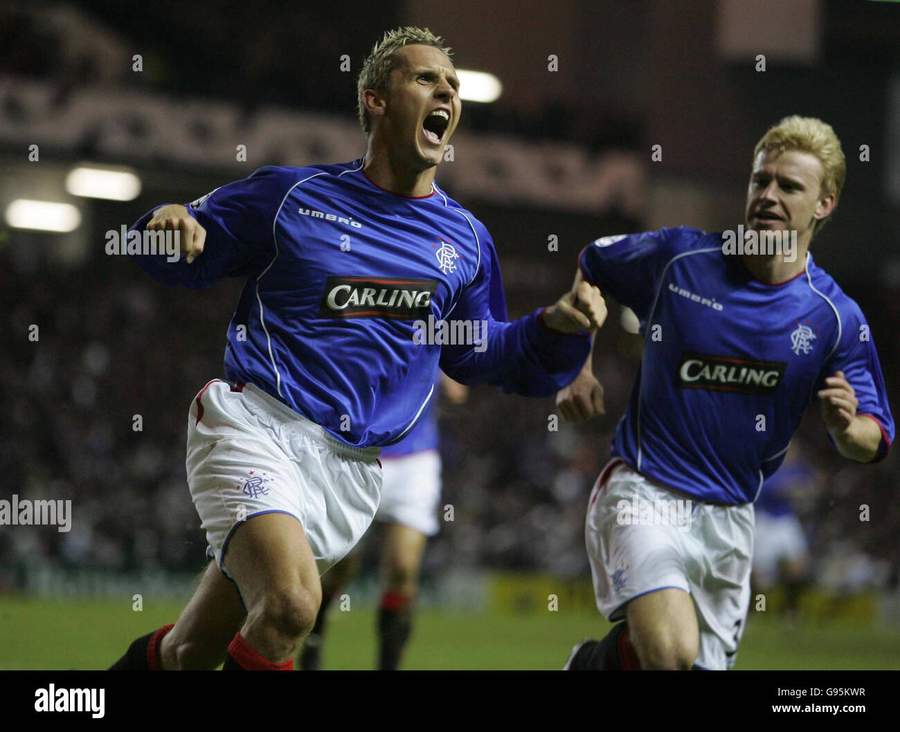 Rangers peter lovenkrands celebrates scoring hi-res stock photography ...
