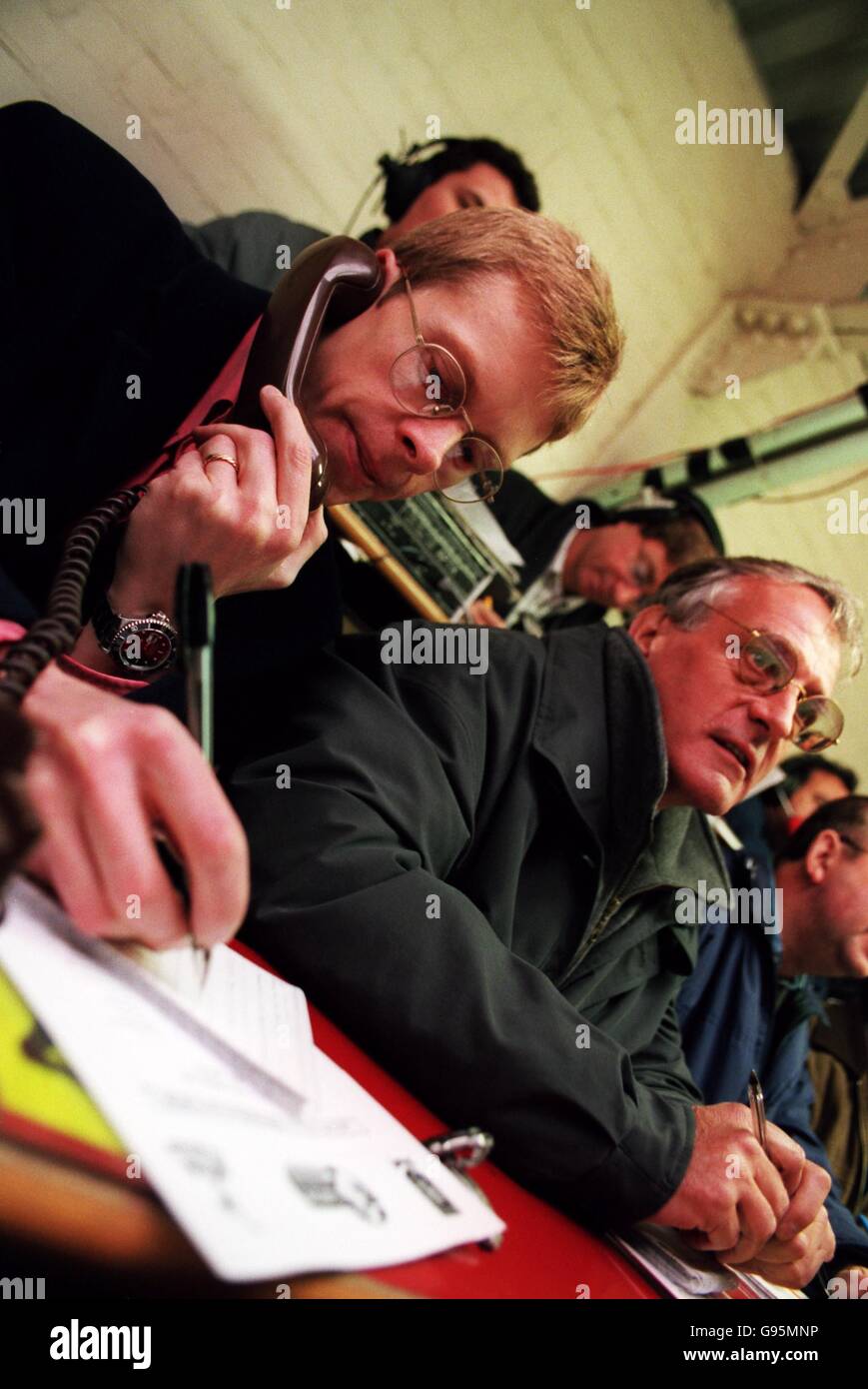 Birmingham Sports Argus reporter Vince Ellis (left) files his report ...