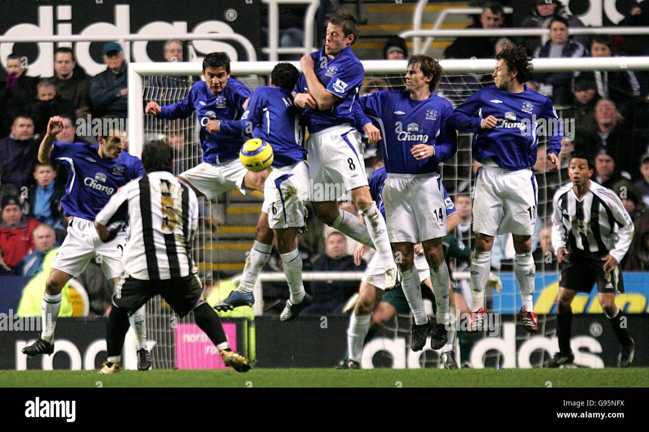 The Everton wall block a free kick from Newcastle United's Belozoglu ...