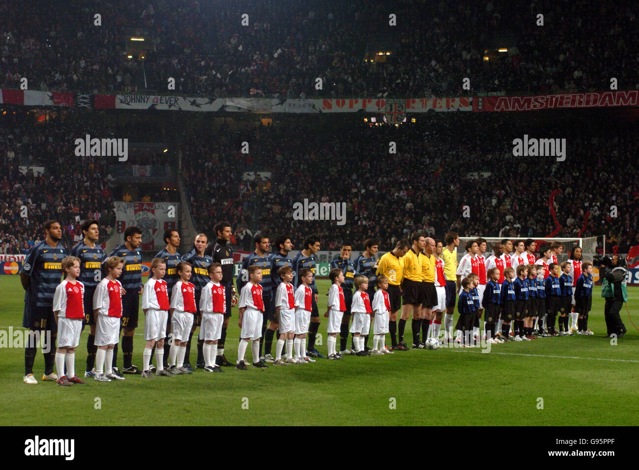 Ajax and Inter Milan players line up prior to kick off Stock Photo - Alamy