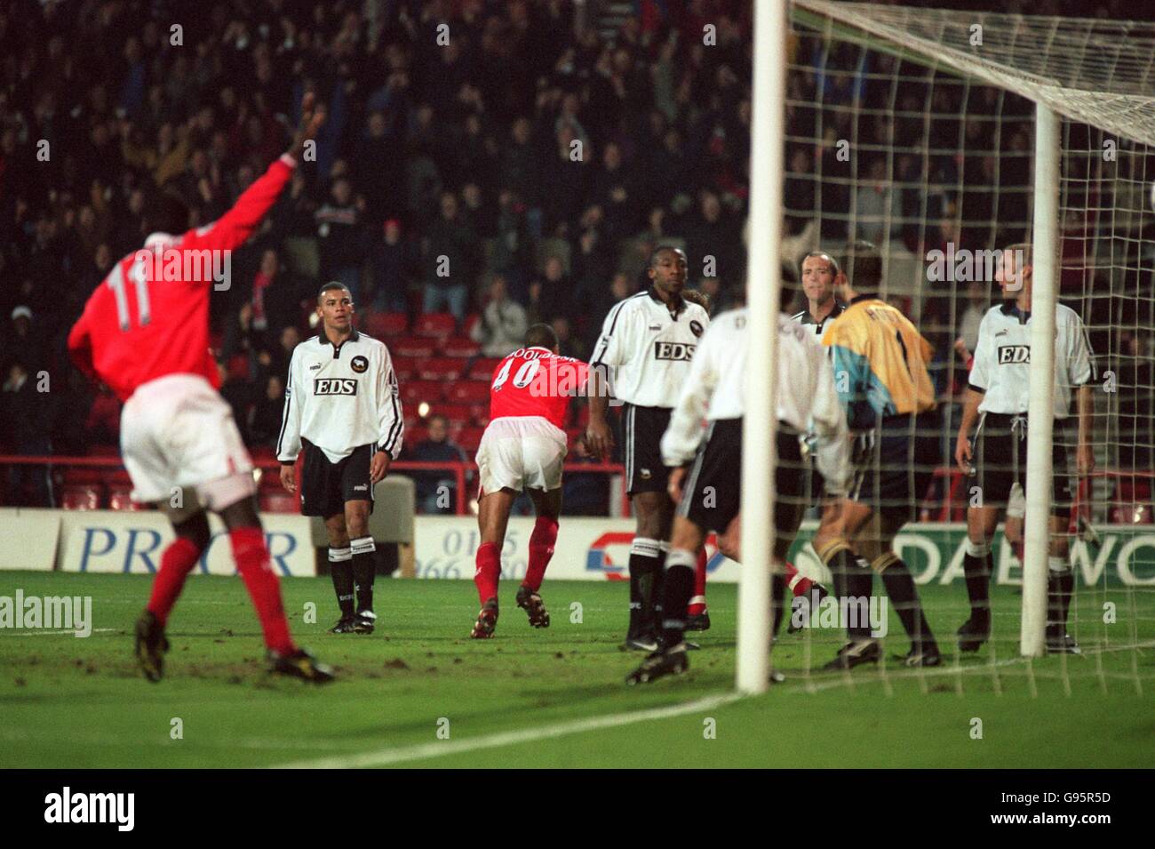 Pierre Van Hooijdonk, Nottingham Forest (40) runs away to celebrate ...