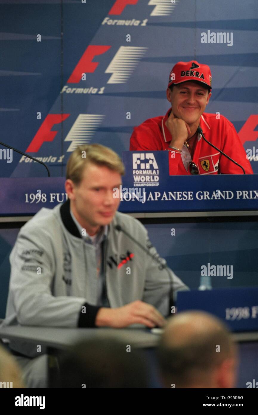 Formula One Motor Racing - Japanese Grand Prix - Preview Day. Mika Hakkinen (left) sits in front ...