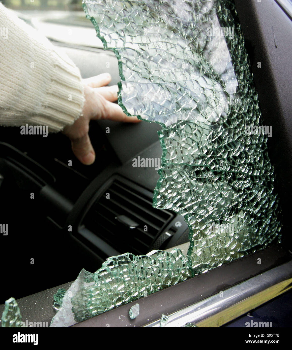Car crime. A broken car window Stock Photo - Alamy