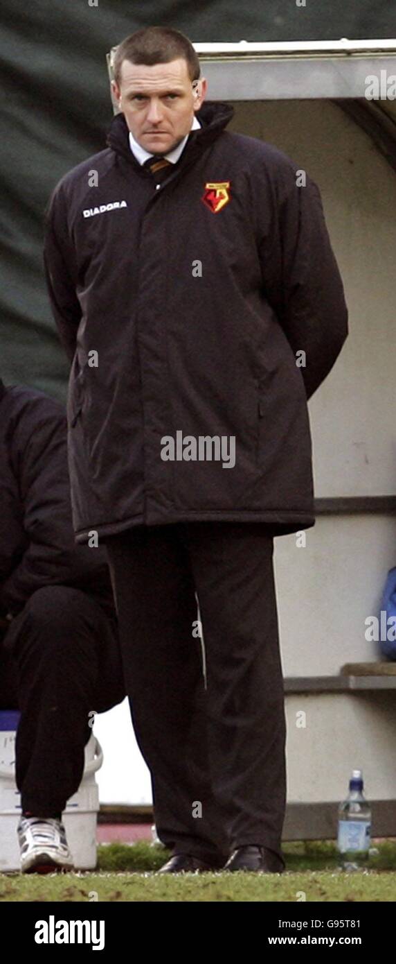 Watford manager Adrian Boothroyd watches as his team play Brighton and ...