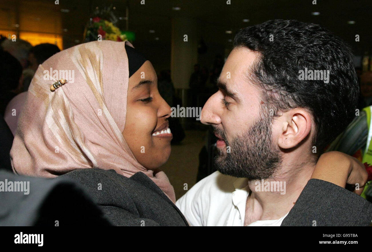 Reza Pankhurst greets his wife Hodan, at Heathrow Airport, Wednesday ...