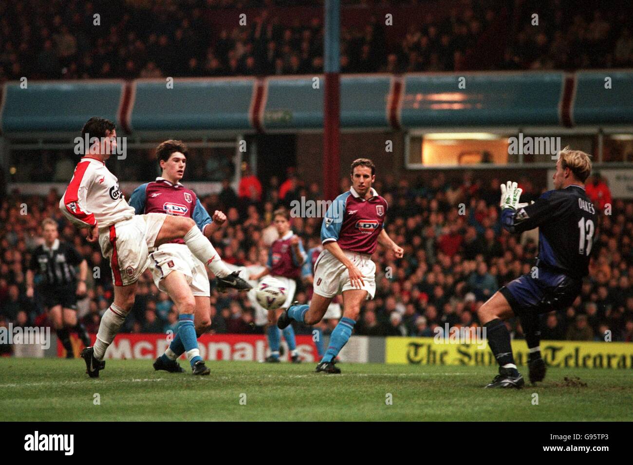 Aston Villa's Gareth Barry and Gareth Southgate can only watch as ...