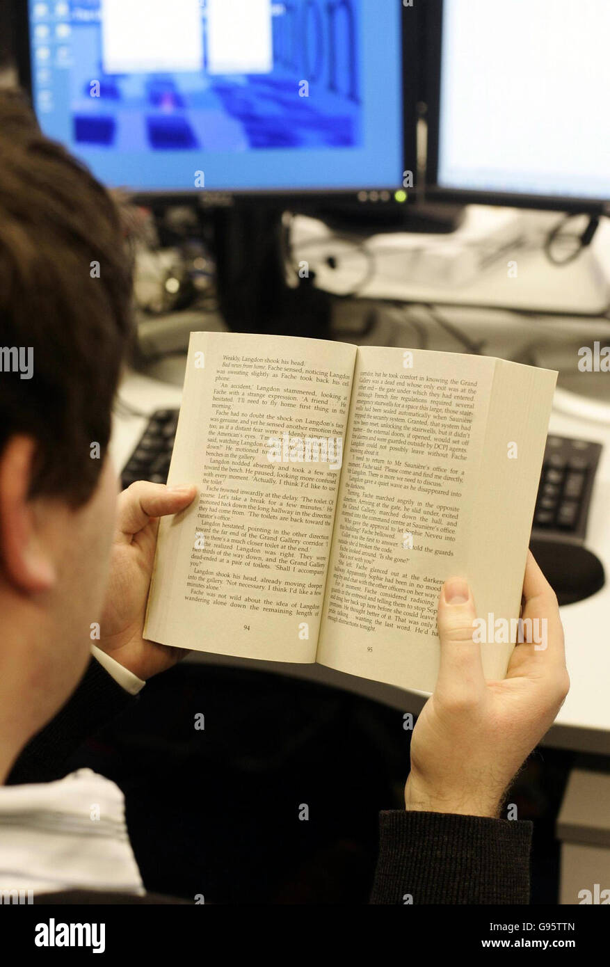 Photo of a worker taking a break and reading a book. Firms were ...
