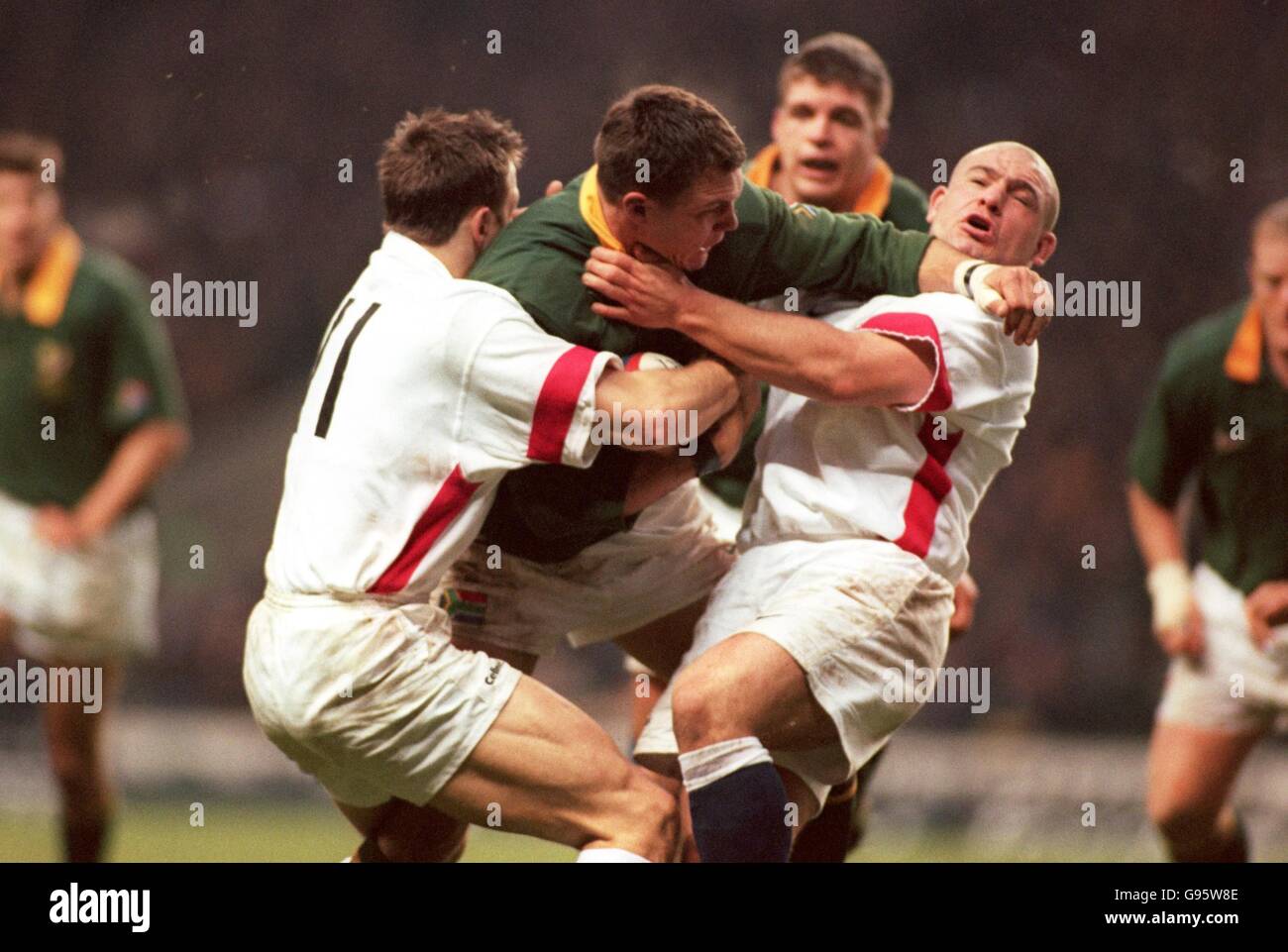 England's David Rees and Richard Cockerill tackle South Africa's Andre ...