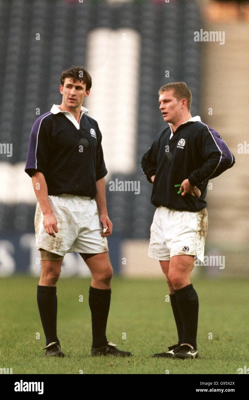 Scotlands john leslie left talks to teammate duncan hodge right hi-res ...