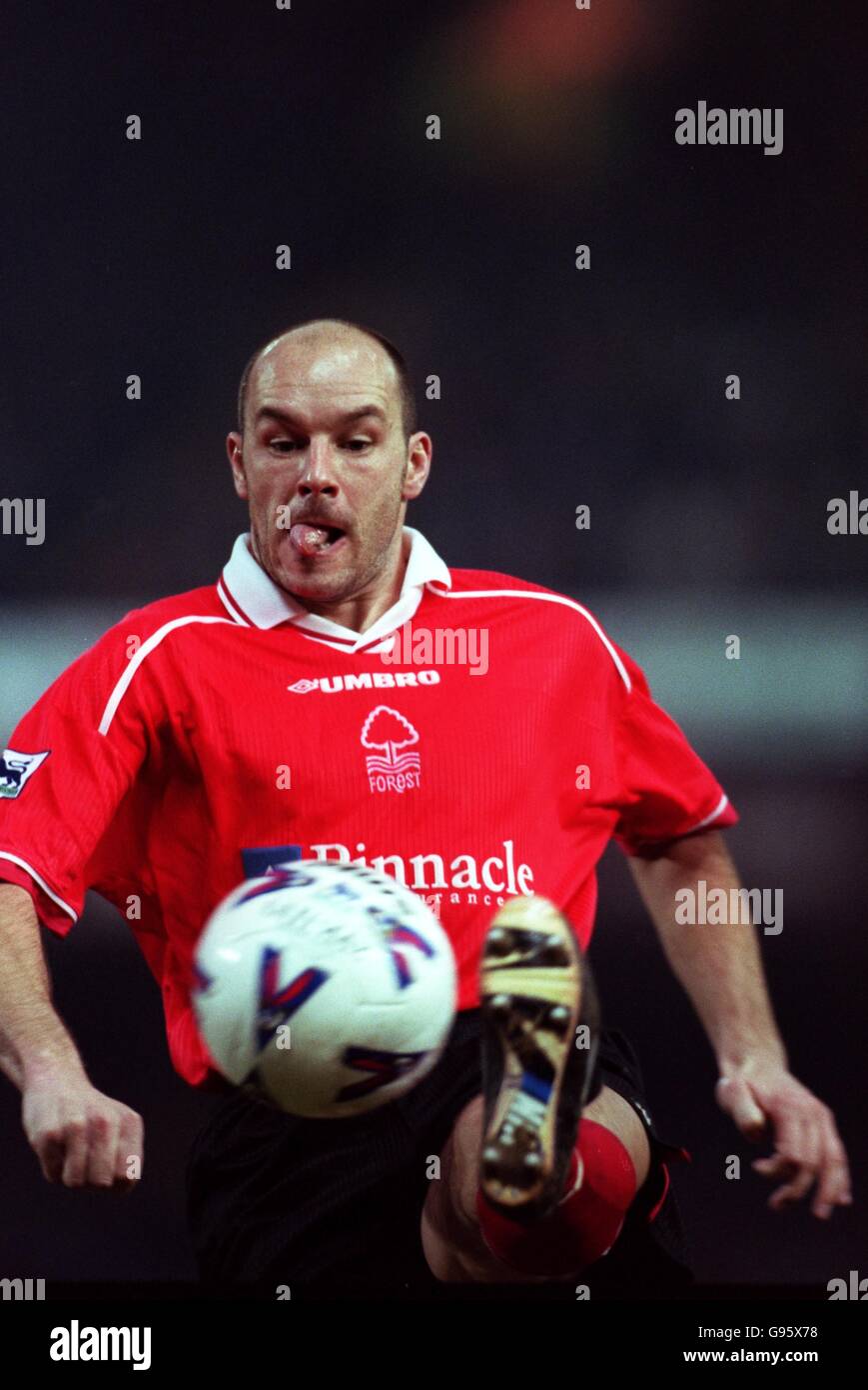 Nottingham forests steve stone controls a bouncing ball hi-res stock ...