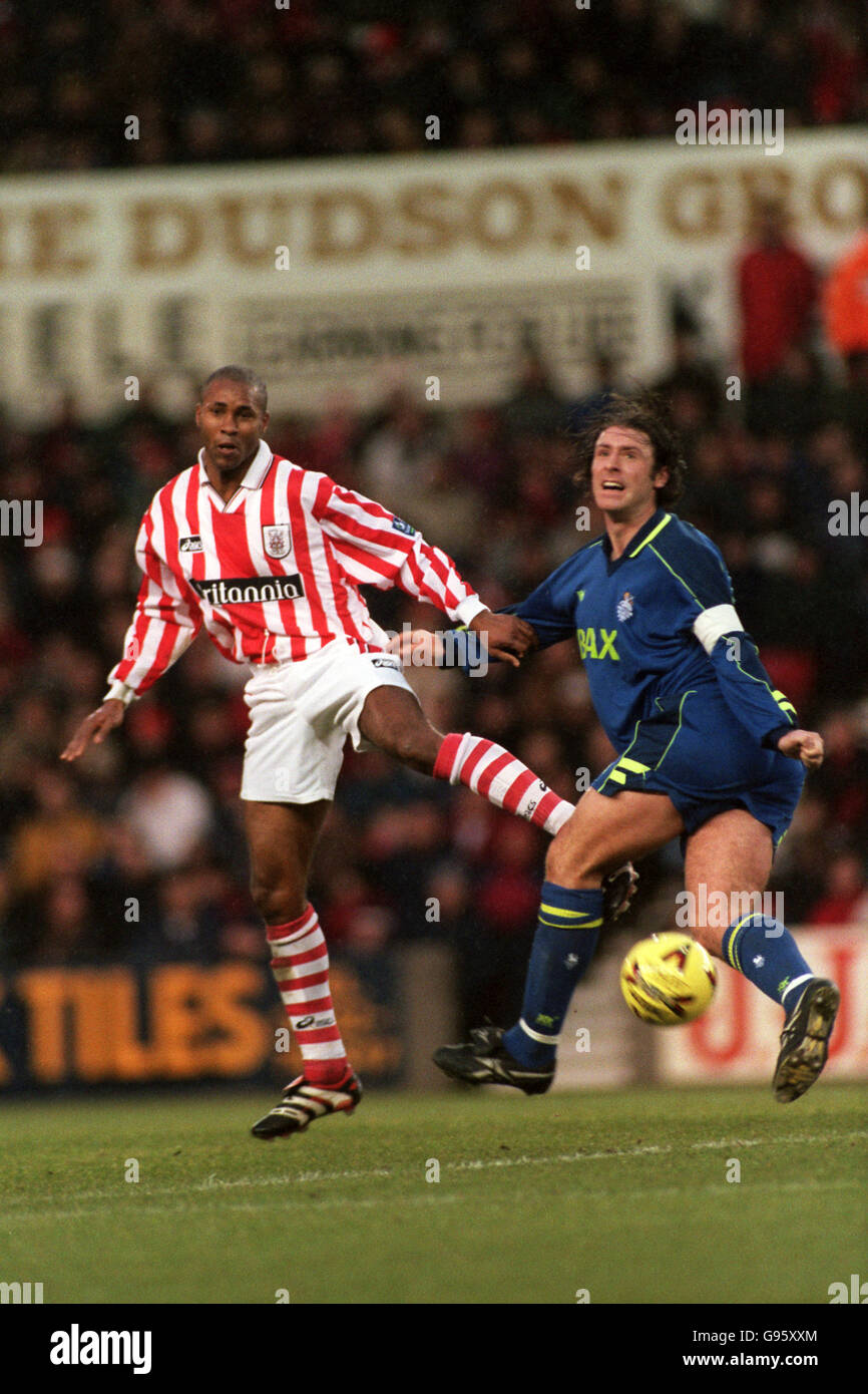 Stoke citys kyle lightbourne outjumps preston north ends sean gregan hi ...