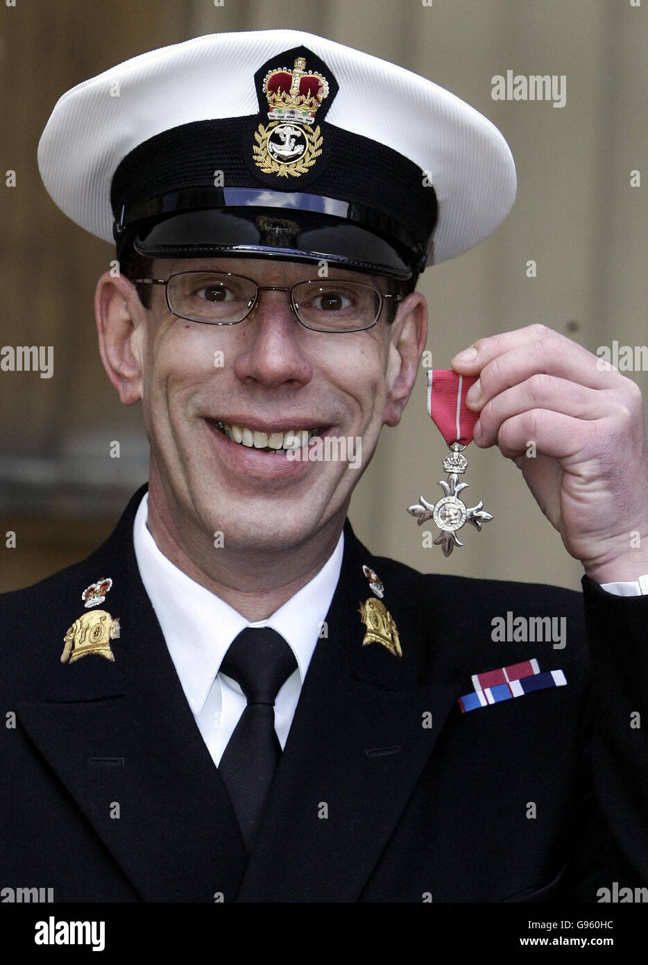 Royal Navy Chief Petty Officer Andrew Moss with his MBE after receiving ...