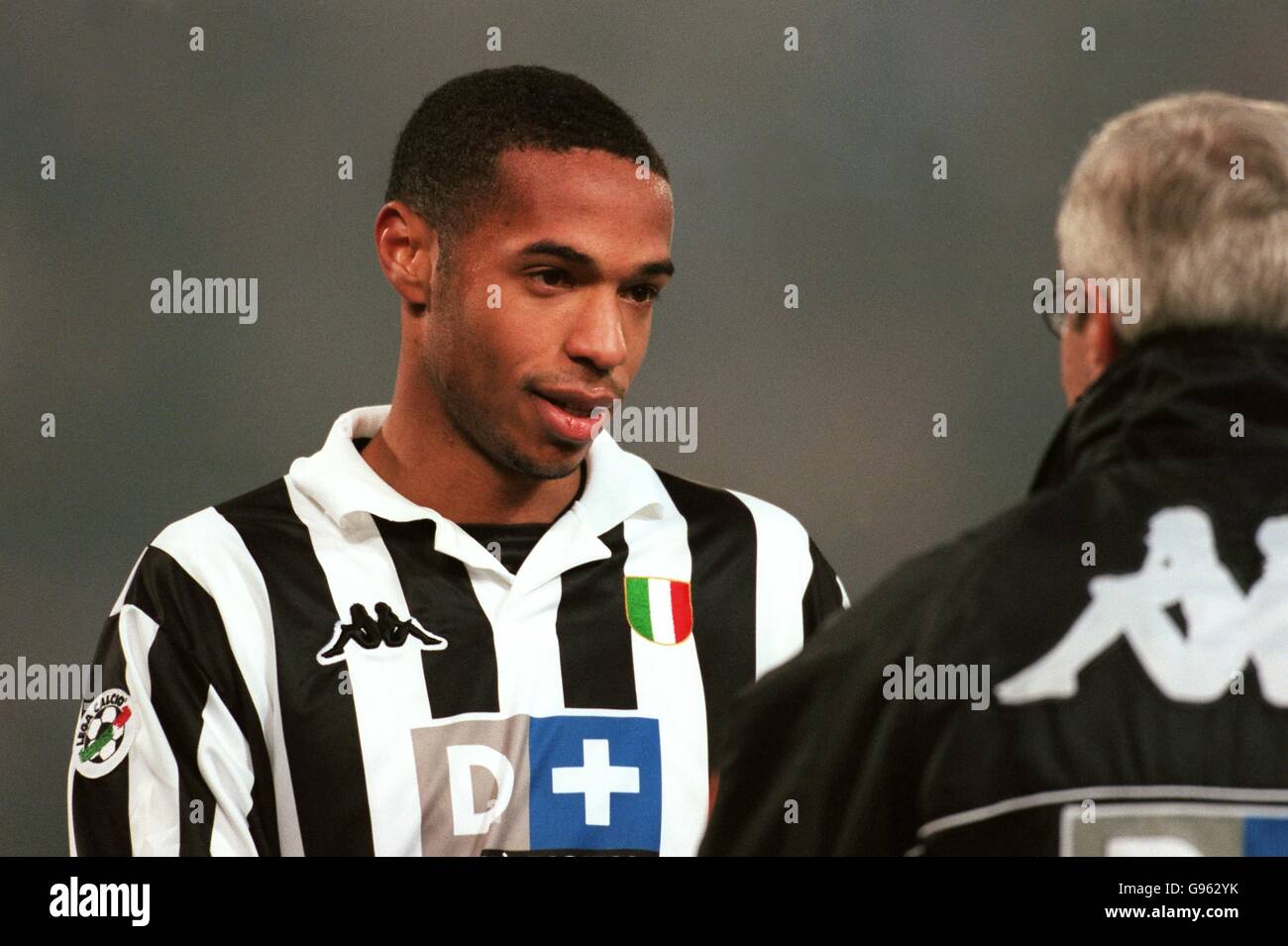 Thierry Henry of Juventus (left) listens to his coach Marcello Lippi ...