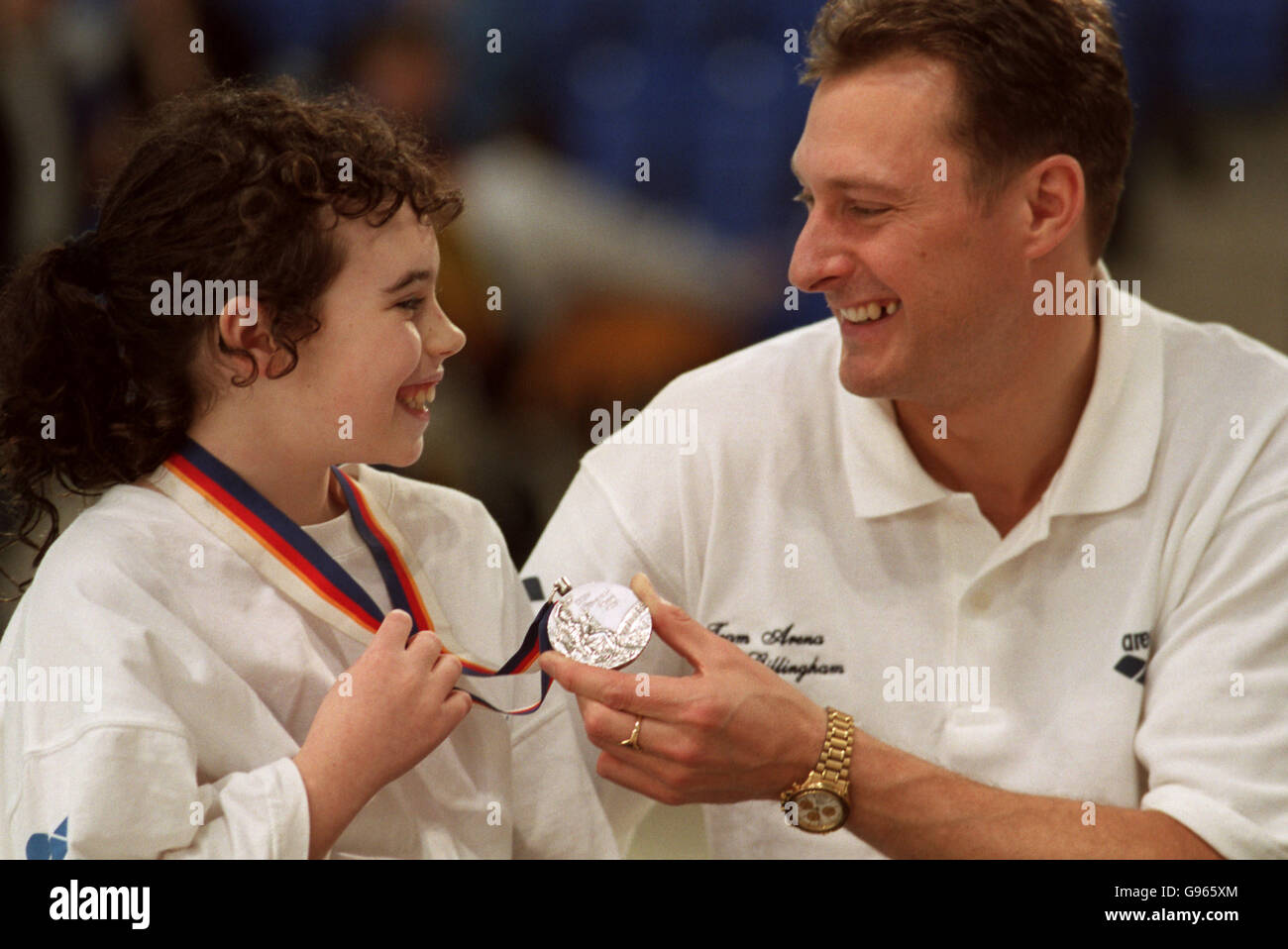 Nick Gilligham lets young Glasgow swimmer Chantal Carr, 9, try his ...